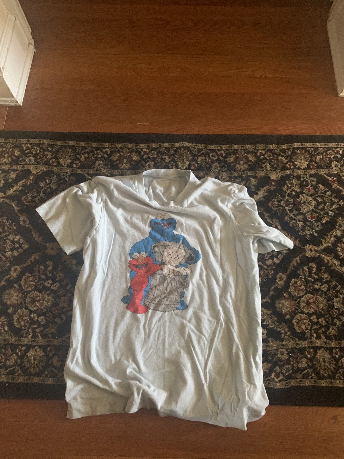 Kaws × Uniqlo KAWS x Uniqlo x Sesame Street Companion Trash Can Tee ...