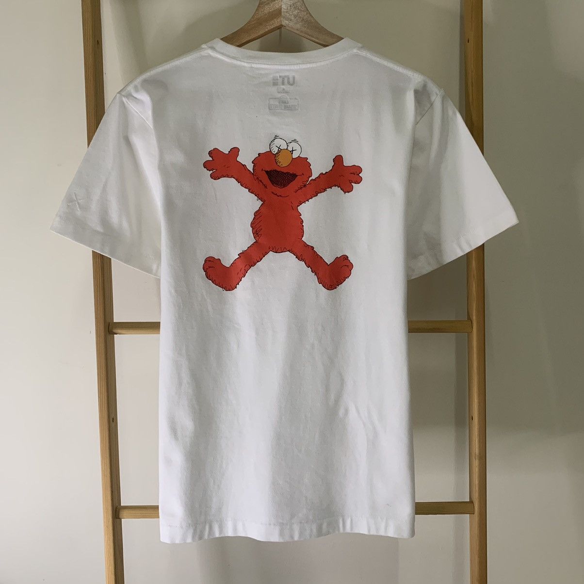 Japanese Brand × Kaws × Uniqlo Kaws Sesama Street Elmo Ut All single ...