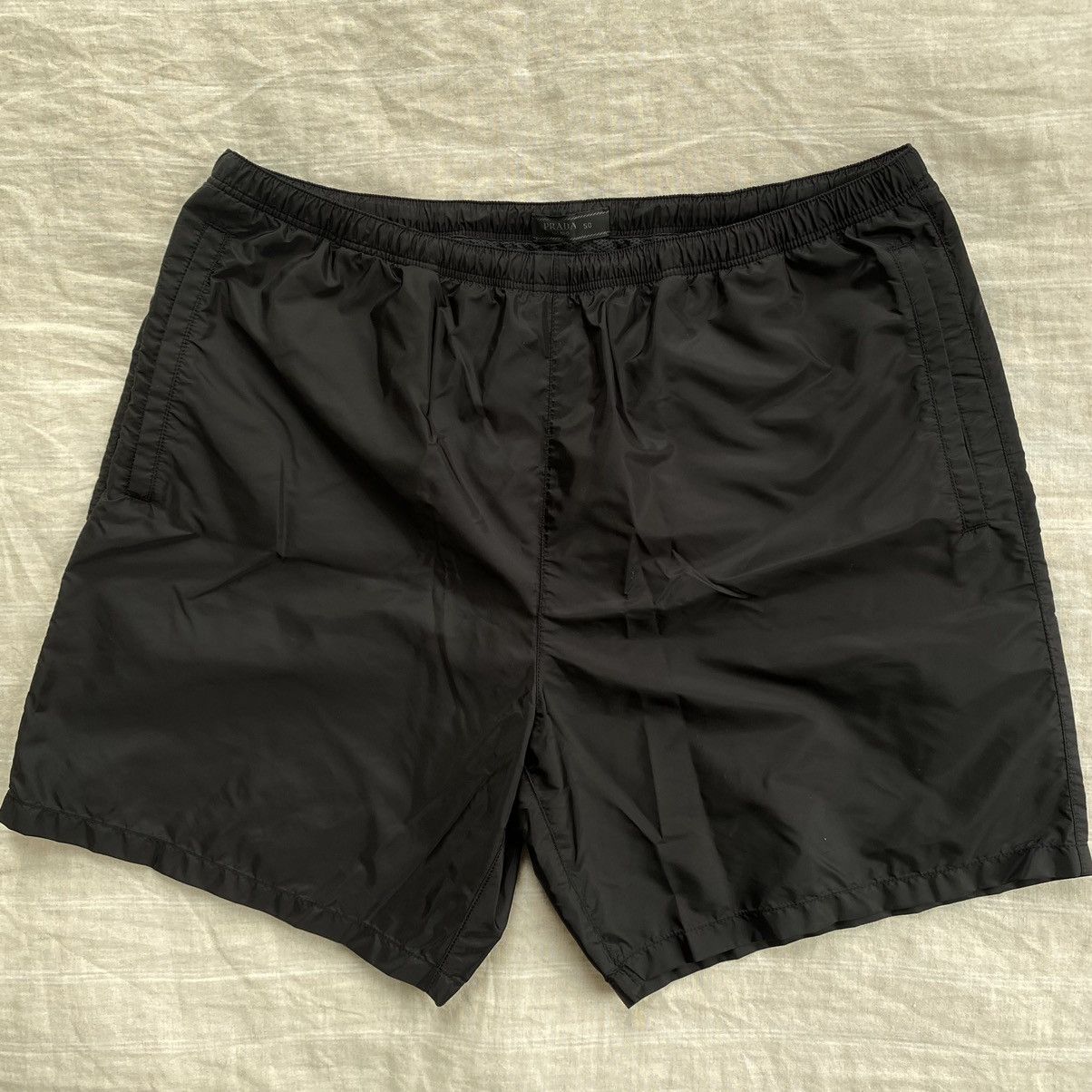Prada FINAL DROP Prada SS22 Re-Nylon Black Swim Trunks | Grailed