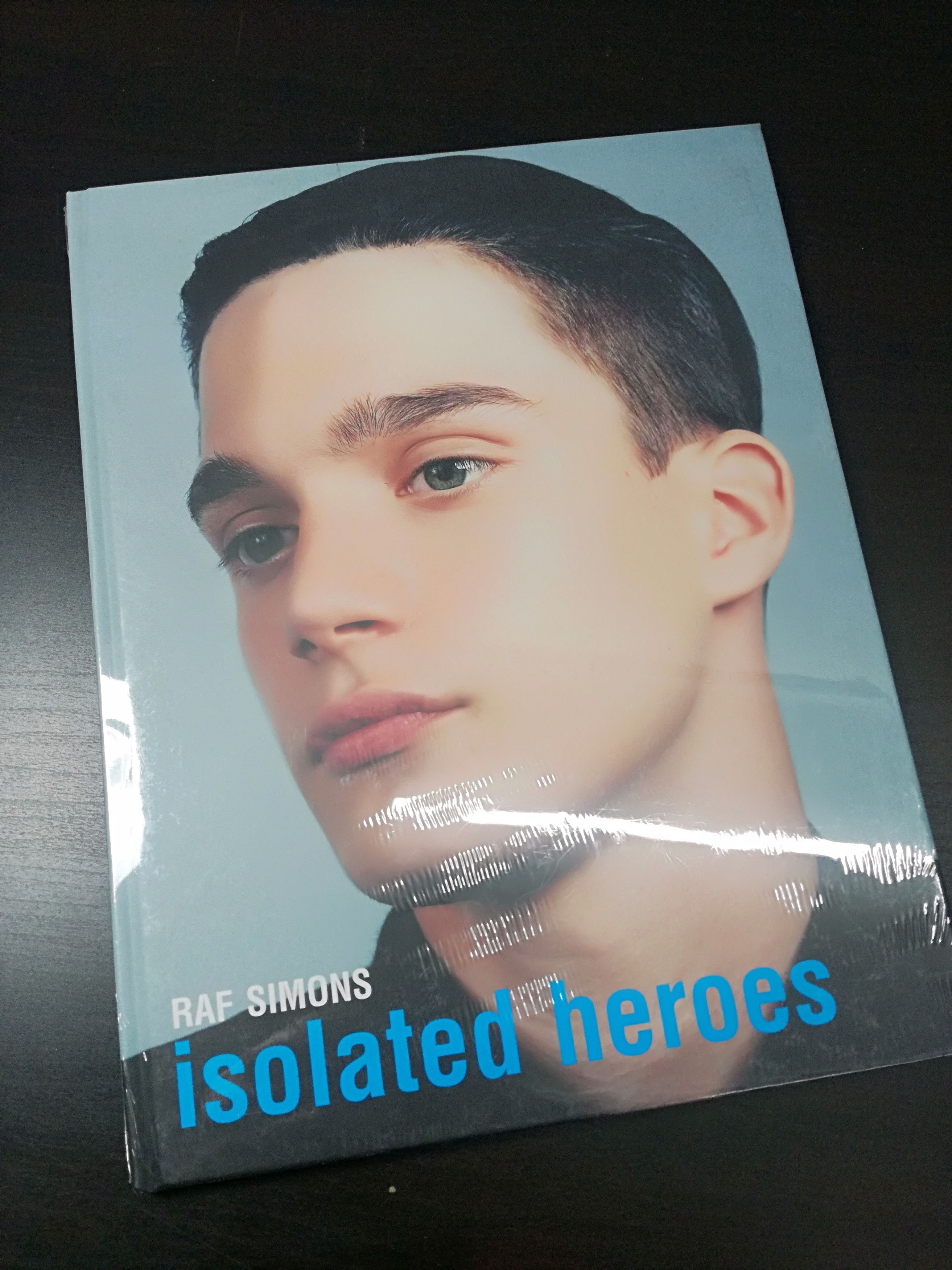 Raf Simons Isolated Heroes book | Grailed