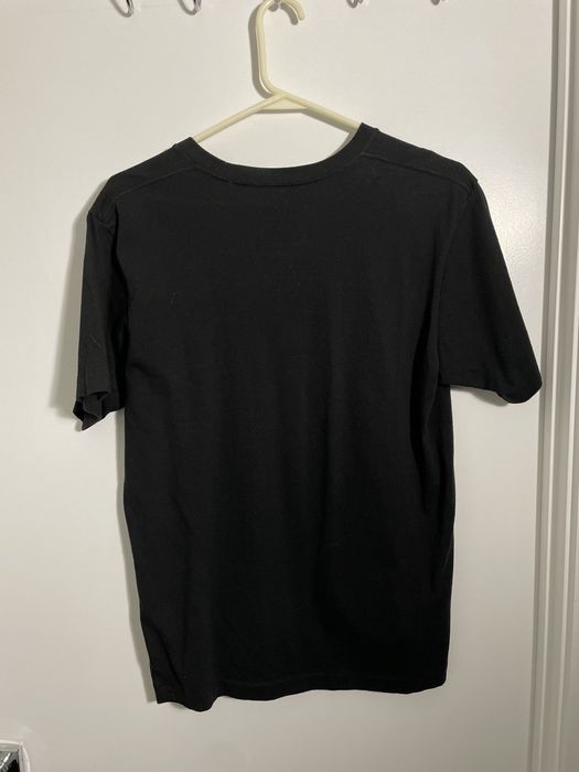 Uniqlo KAWS Peanuts Uniqlo Spooky Ghost Tee (Halloween) | Grailed