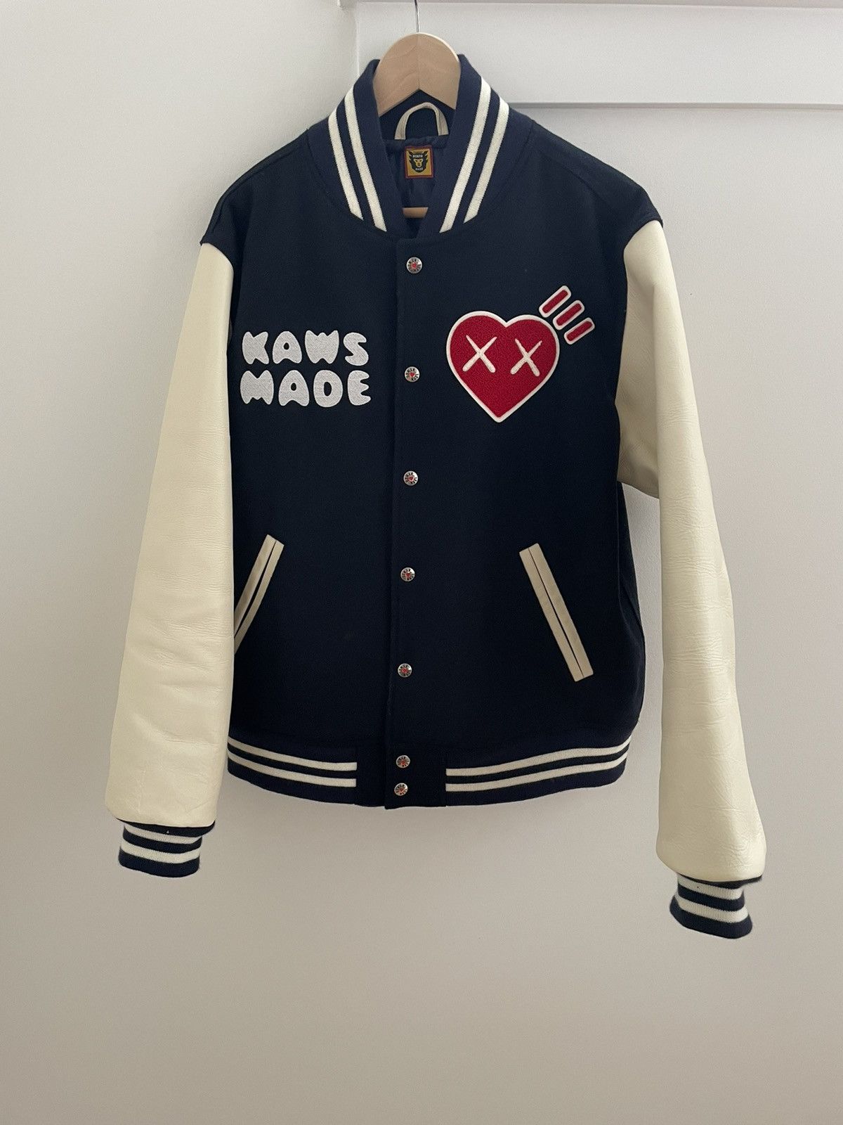 Human Made Kaws varsity jacket | Grailed