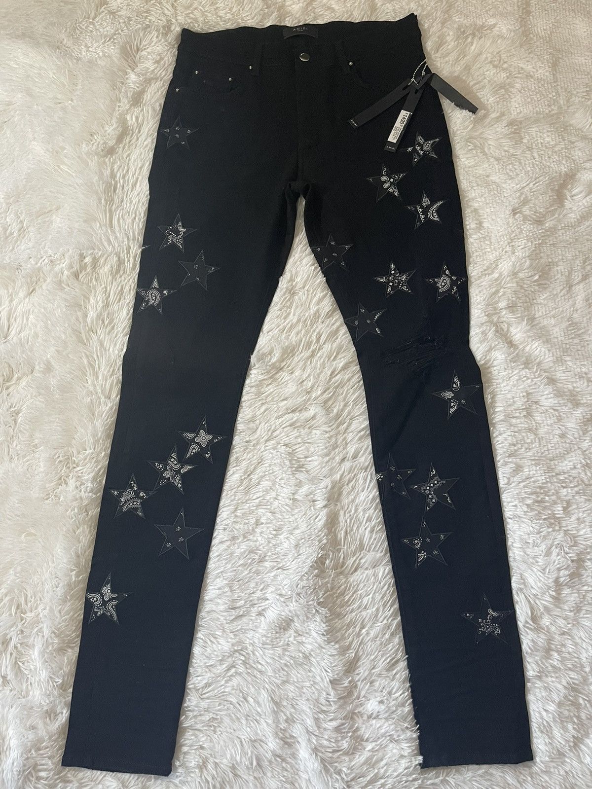 Amiri AMIRI star-patch jeans | Grailed