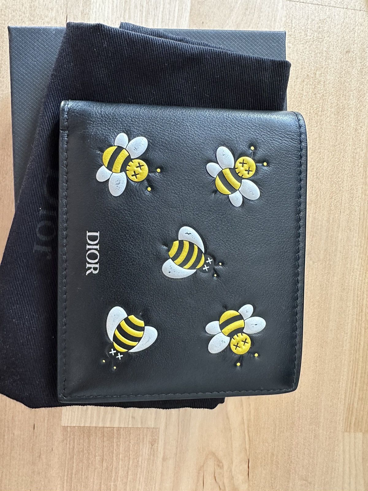 Dior × Kaws Dior x Kaws Wallet | Grailed