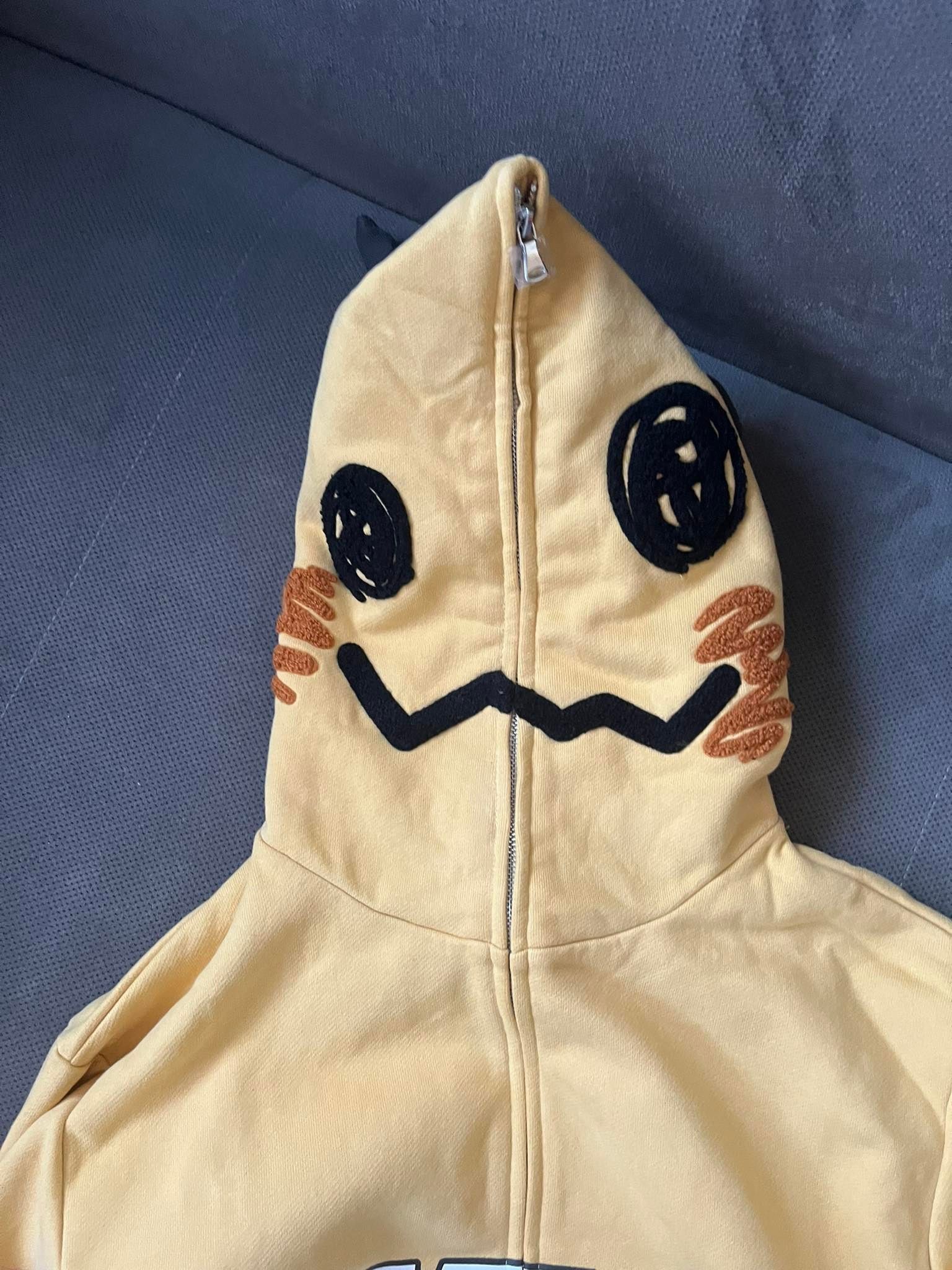 Designer × Pokemon KANTOSTARTER Mimikyu face hoodie | Grailed