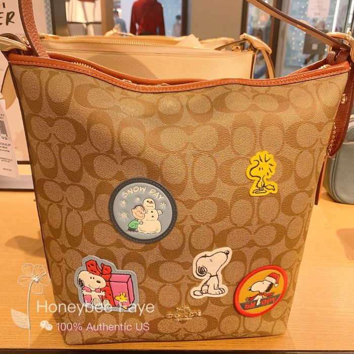 Coach Coach X Peanuts Val Duffle In Signature Canvas With Patches | Grailed