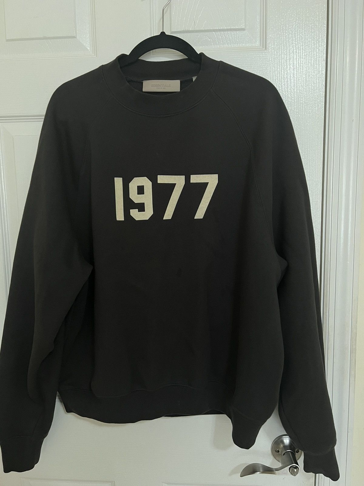 Fear of God Essentials soft Black '1977' Sweatshirt | Grailed