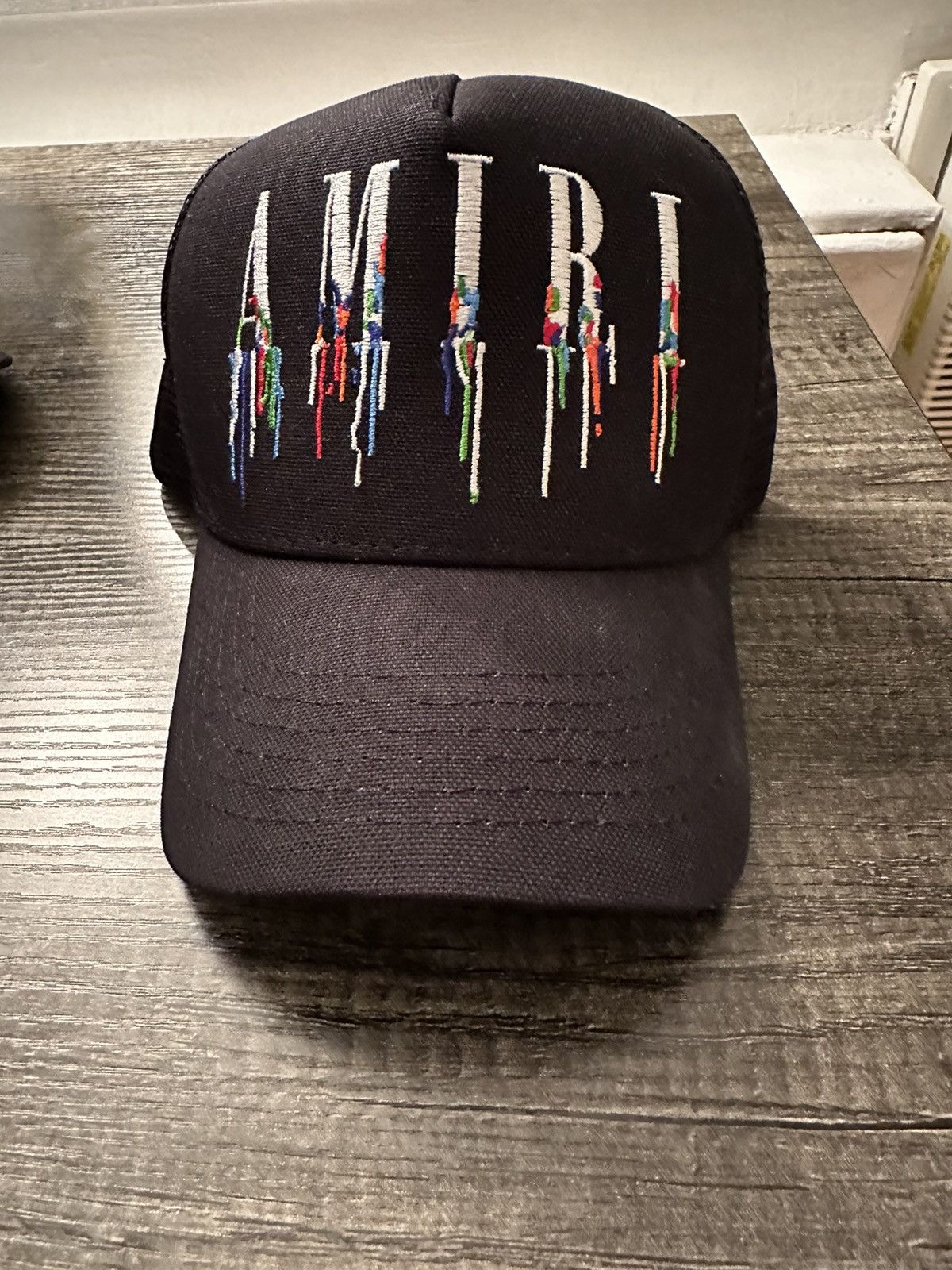 Amiri Amiri Paint Logo Trucker Hat | Grailed