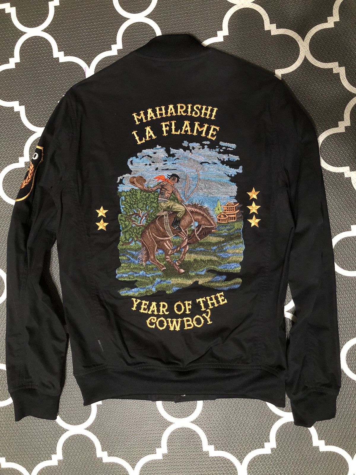 Maharishi × Travis Scott Travis Scott x Maharishi La Flame Rodeo Cowboy ...