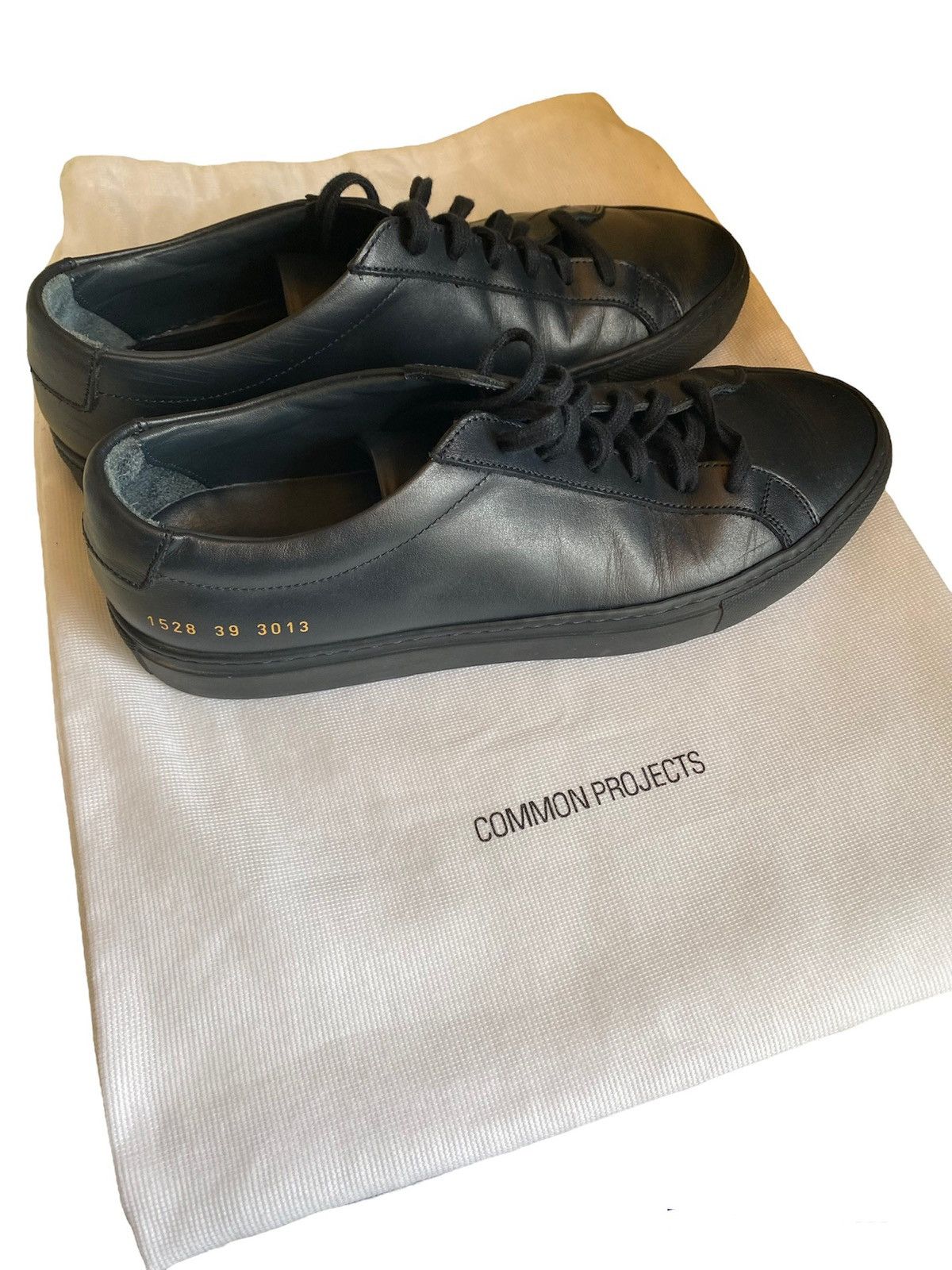 Common Projects Black Common Project Leather Sneaker | Grailed