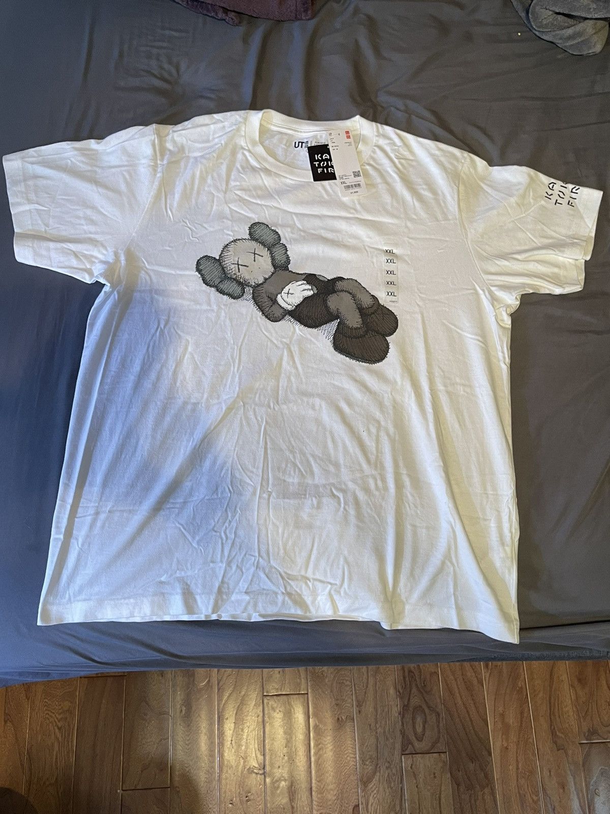 Kaws Kaws x Uniqlo Tokyo First Tee White (asia sizing) | Grailed