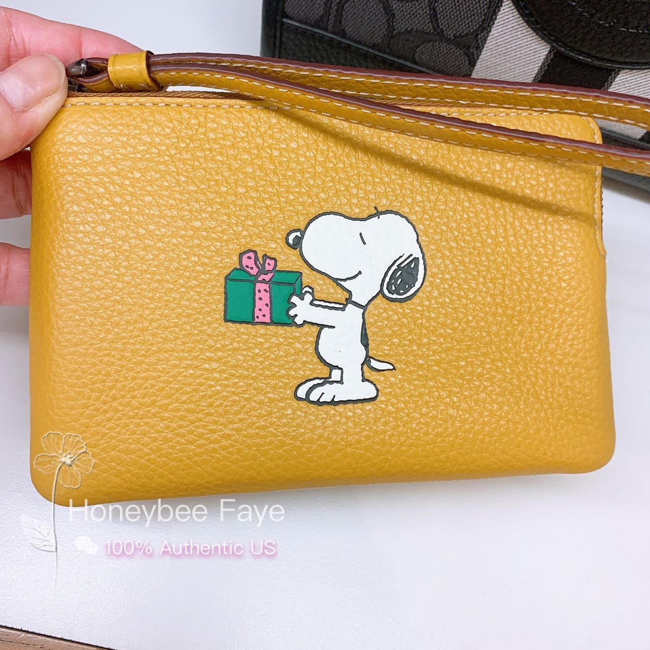 Coach Peanuts Corner Zip Wristlet With Snoopy Present Motif | Grailed