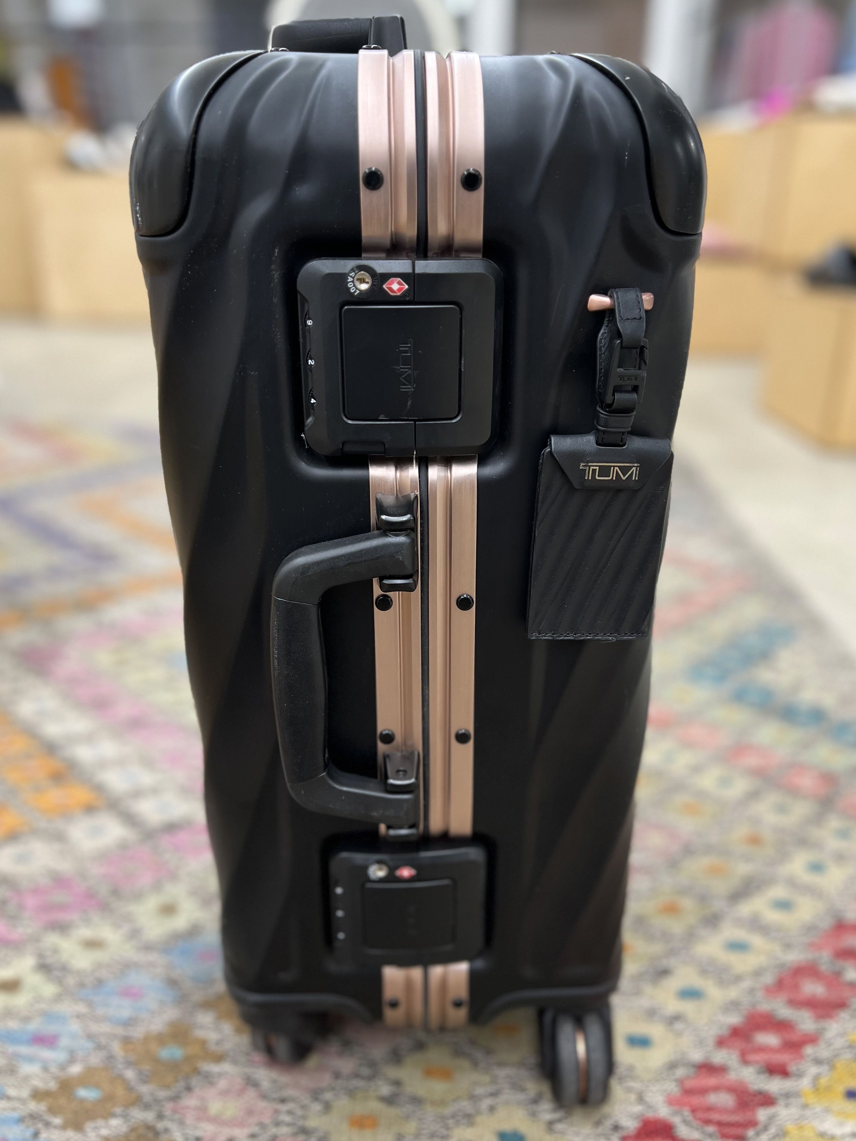 Tumi Coveted Very Rare $1100 TUMI Stunning Rose Gold/Black | Grailed