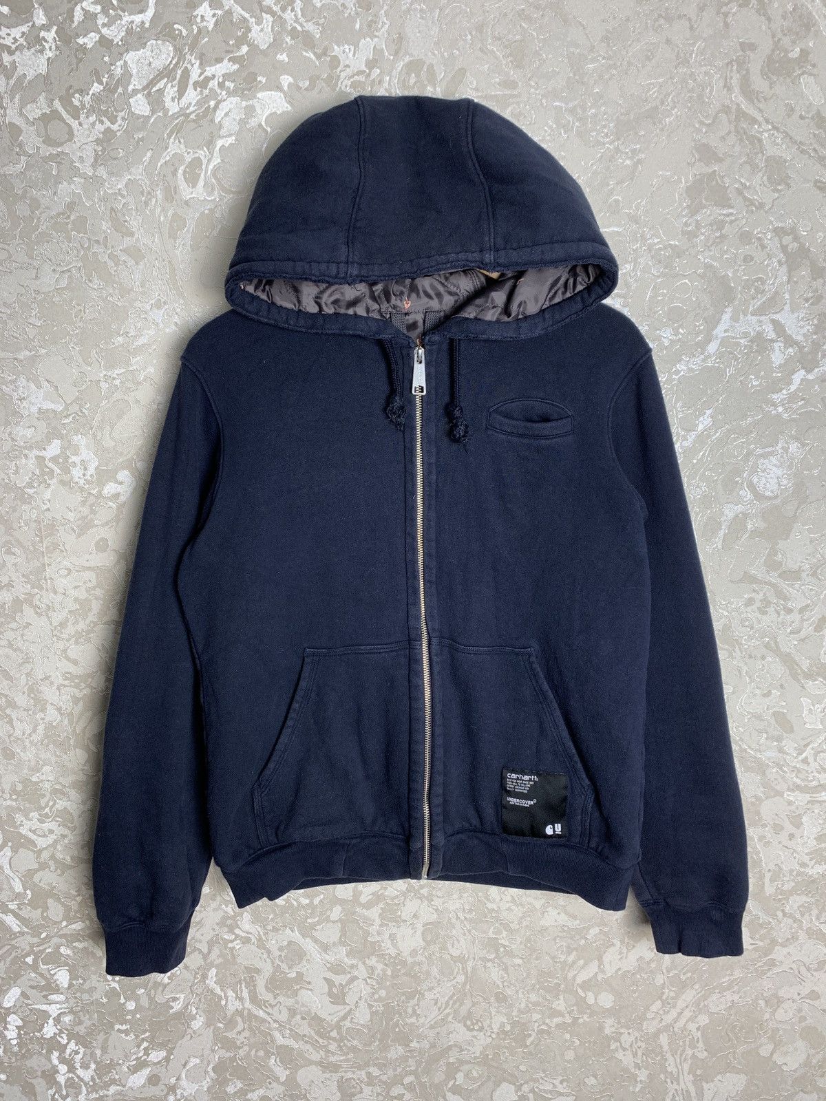 Carhartt × Undercover Undercover X Carhartt Down Middle Finger Zip Up ...