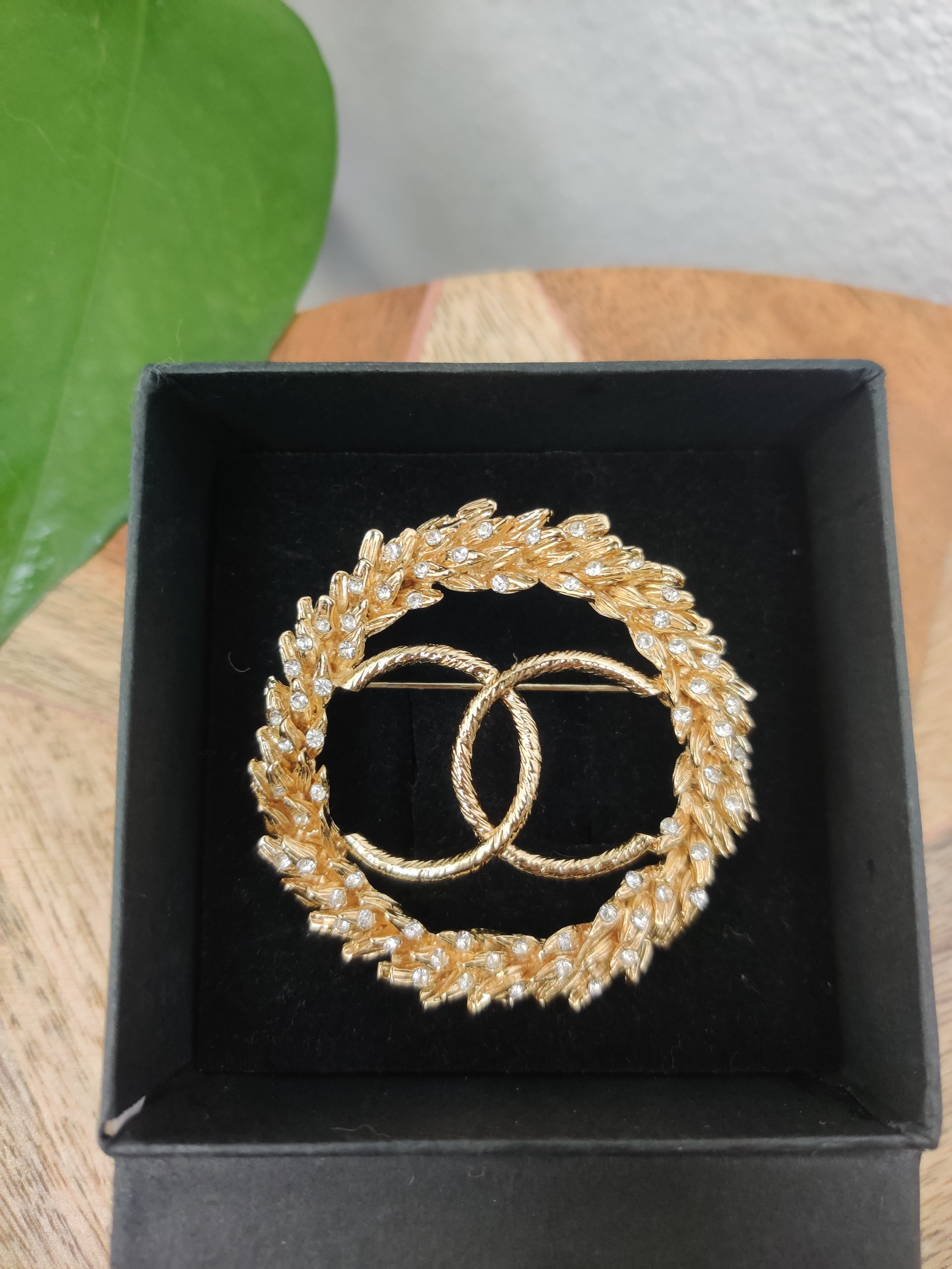 Chanel Coco Chanel Gold and Crystals Brooch | Grailed