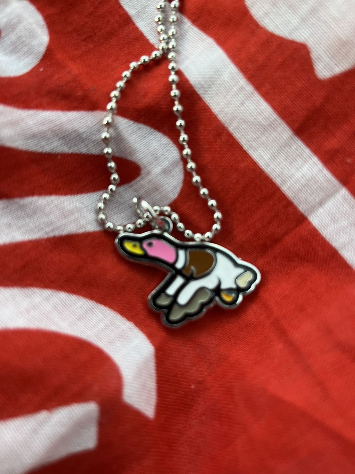 Human Made Human Made Pink Flying Duck Pendant Necklace | Grailed