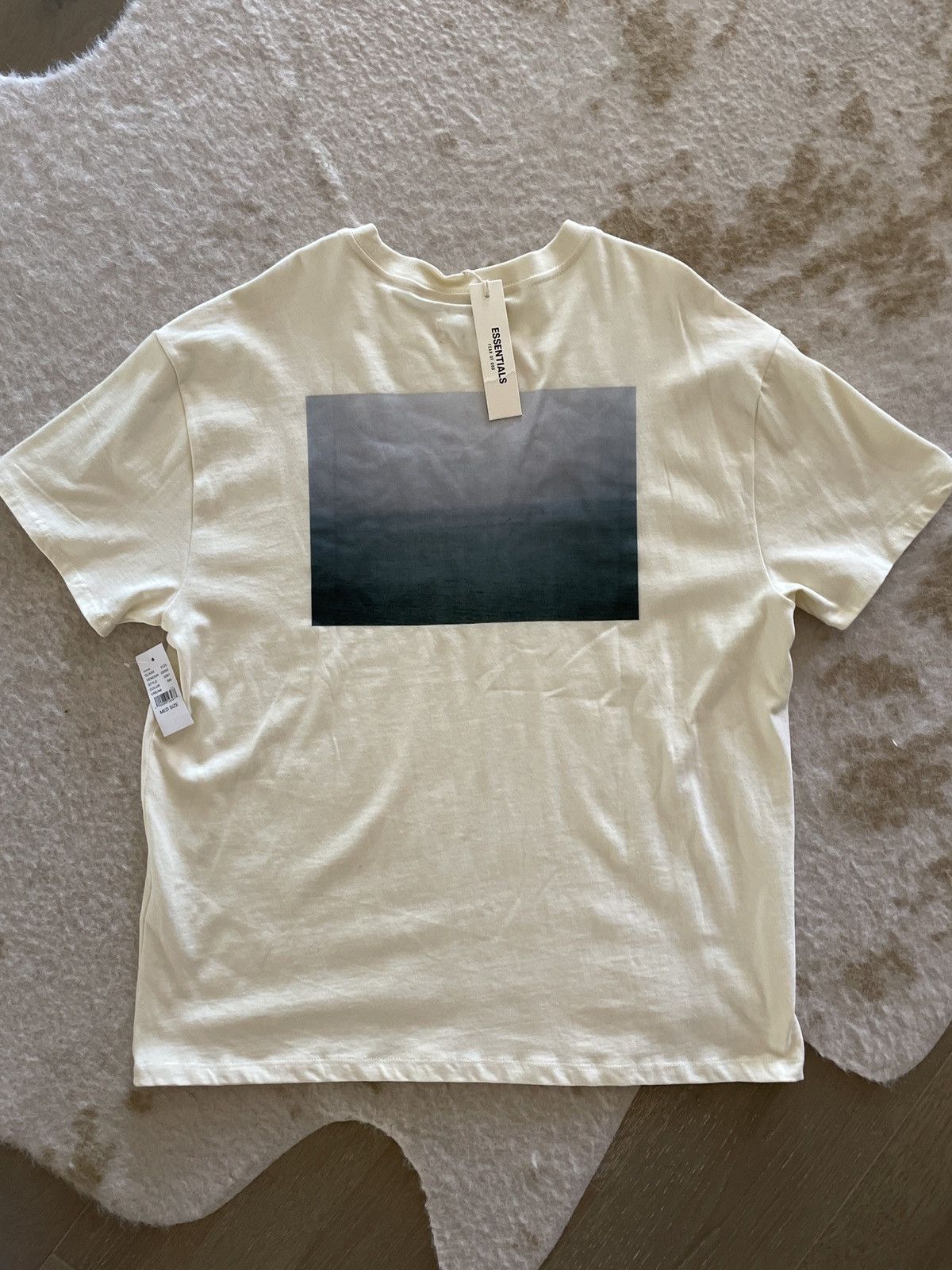 Fear of God Fear of God Cream Essentials Boxy Photo series Tee | Grailed
