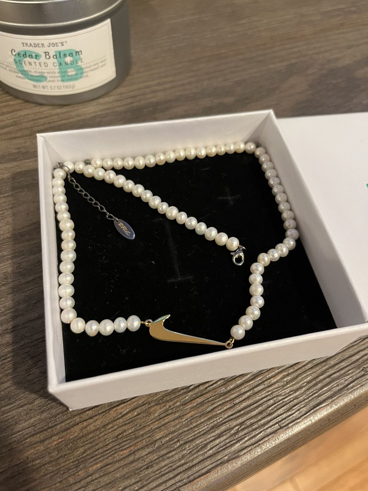 Nike pearl necklace store