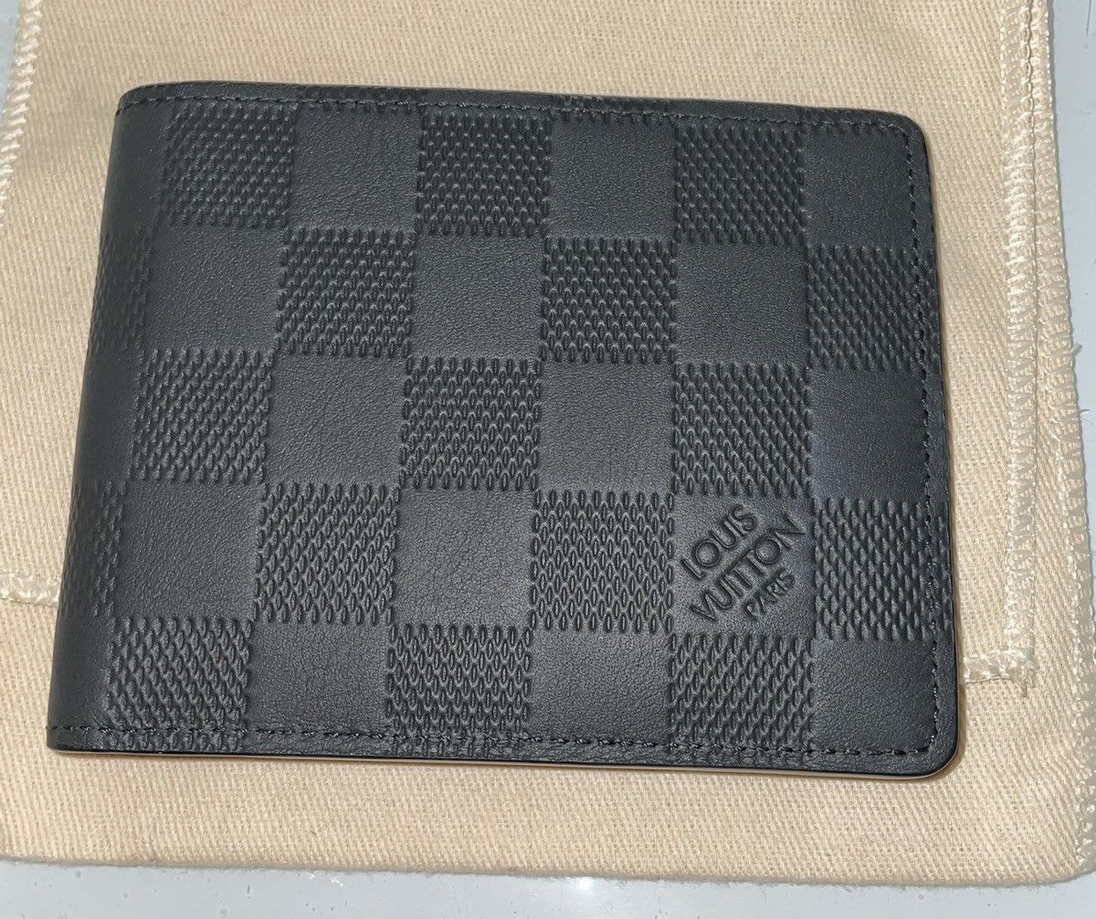 Louis Vuitton Louis Vuitton black wallet | Grailed