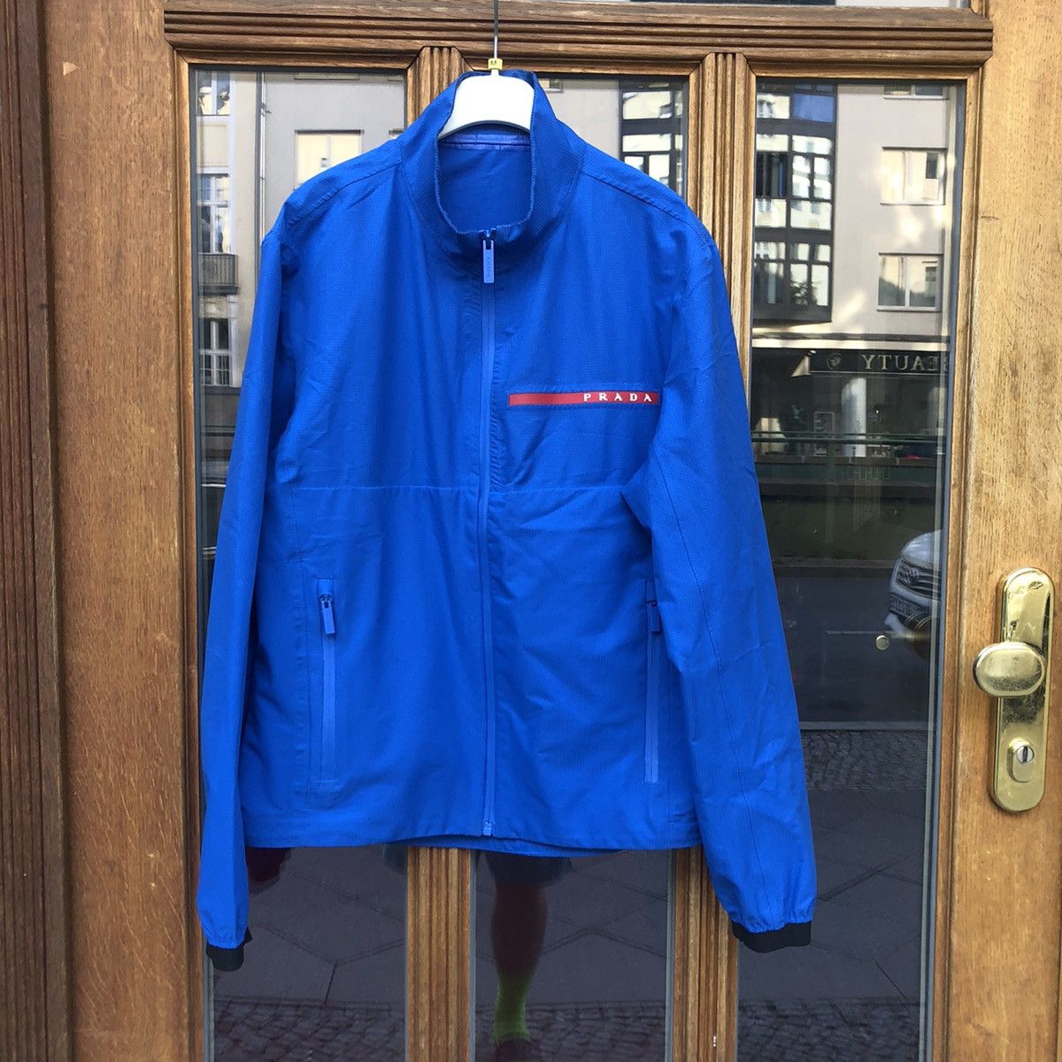 Prada Prada linea rossa logo light jacket | Grailed