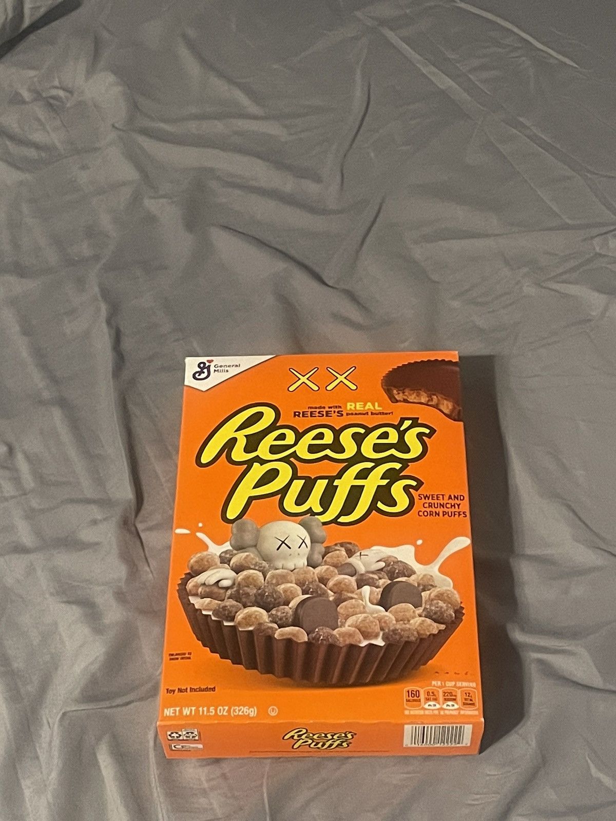 Kaws Kaws x Reece's Puffs Cereal Box | Grailed