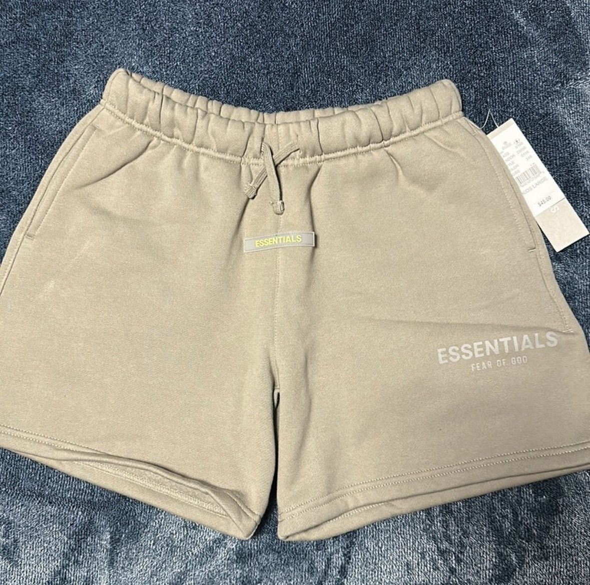 Essentials Kids Fear of God shorts | Grailed