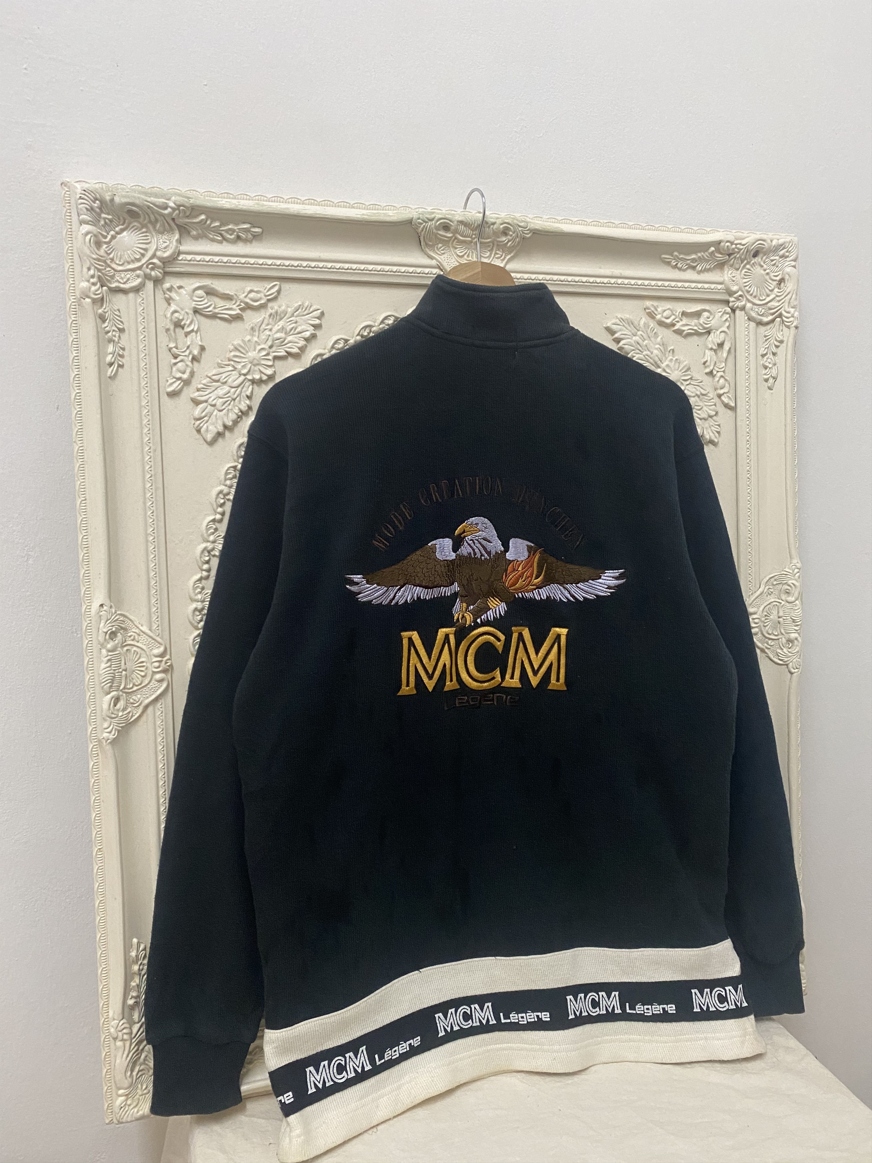Designer × MCM Mode Creation Mùnchen MCM eagle big logo quarter zipper ...