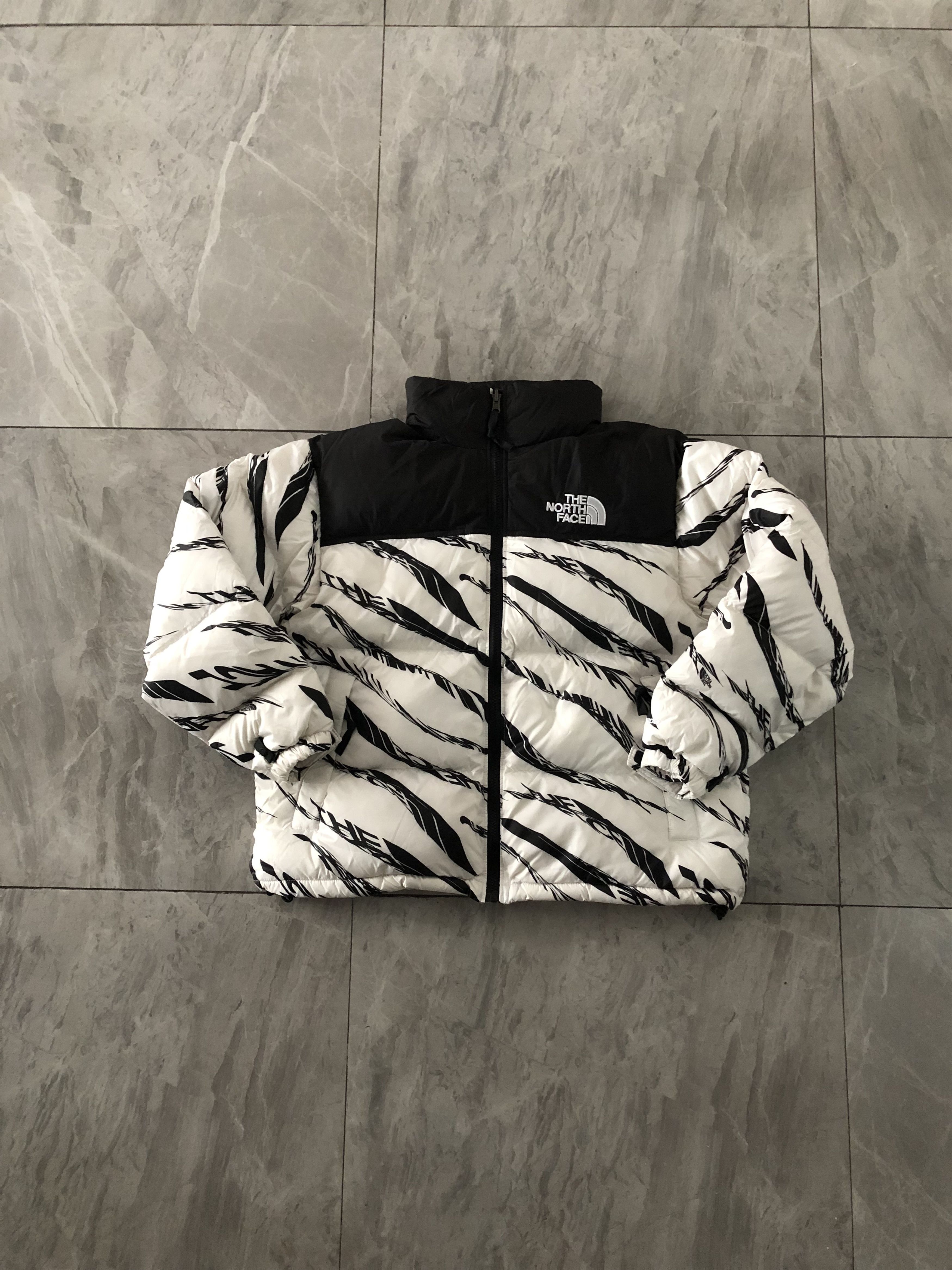 The North Face The North Face Nuptse Zebra Print Pattern Heavy Coats ...