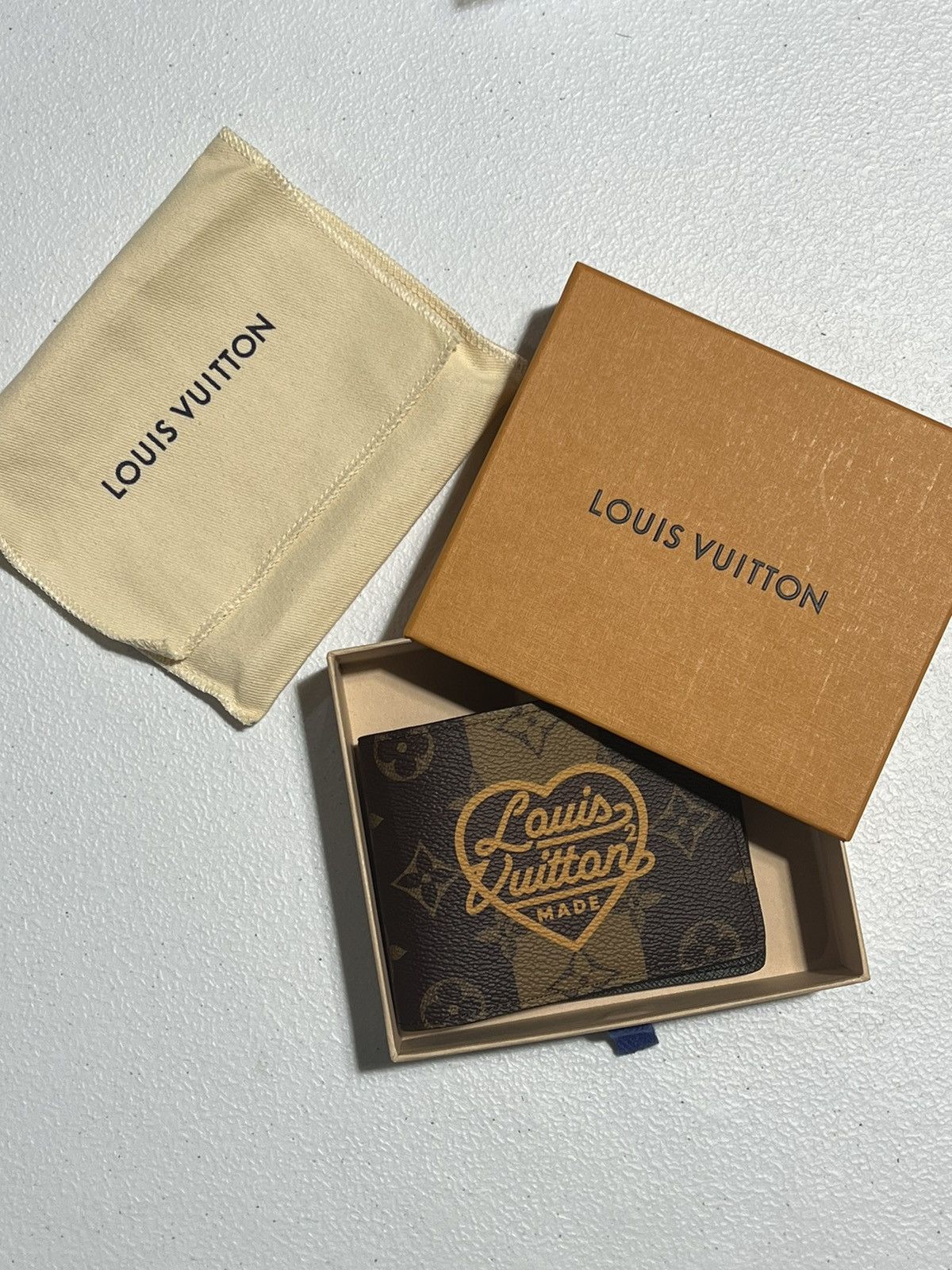 Louis Vuitton Louis Vuitton Nigo Human Made Monogram Wallet | Grailed