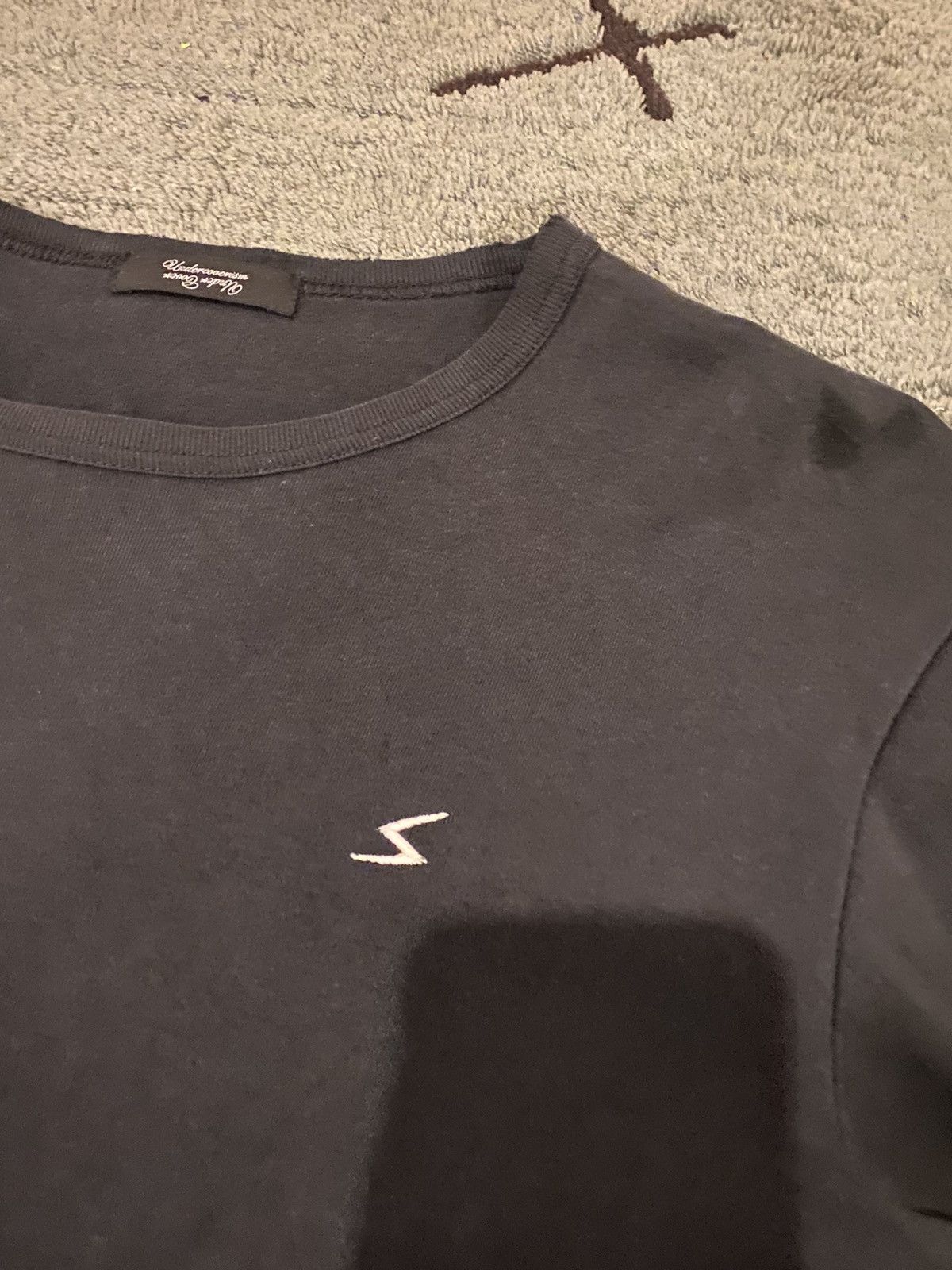 Undercover Undercover Lightning Bolt Logo Distressed 3/4 Sleeve | Grailed