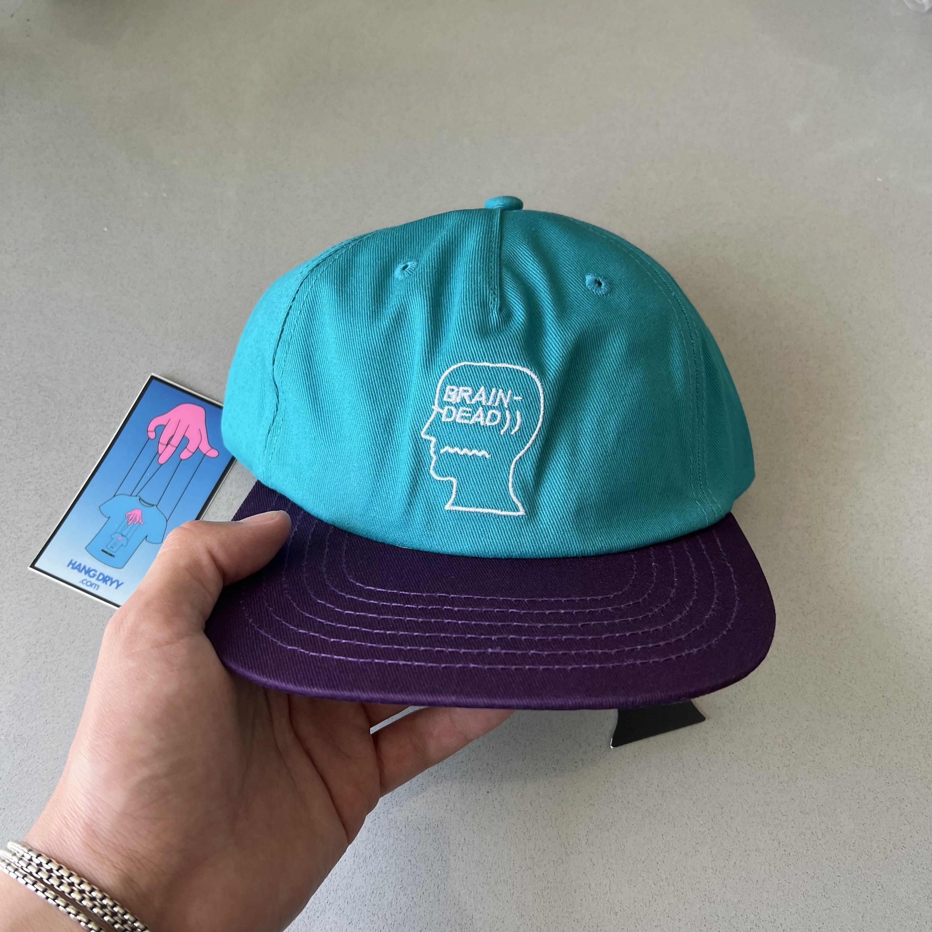 Brain Dead EXCLUSIVE 5 PANEL TWILL LOGO HEAD HAT | Grailed