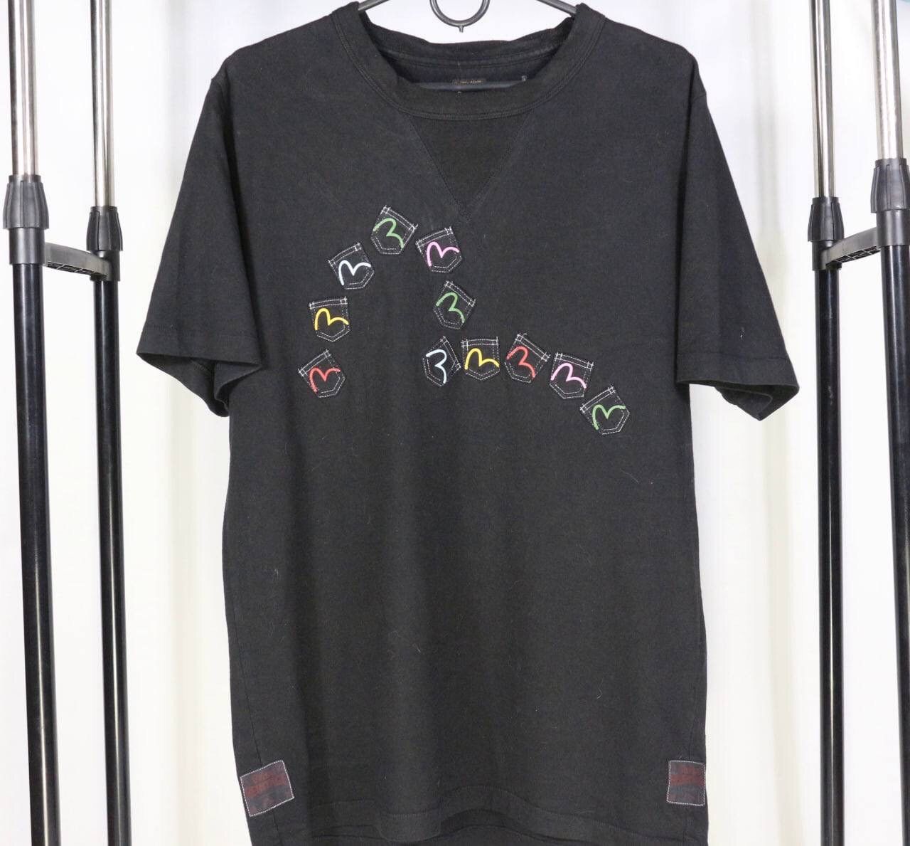 Evisu Evisu Heritage T-shirt very rare multi pocket logo | Grailed