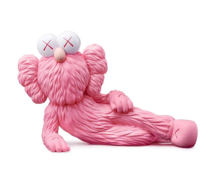 Kaws Time off vinyl figurine - pink | Grailed