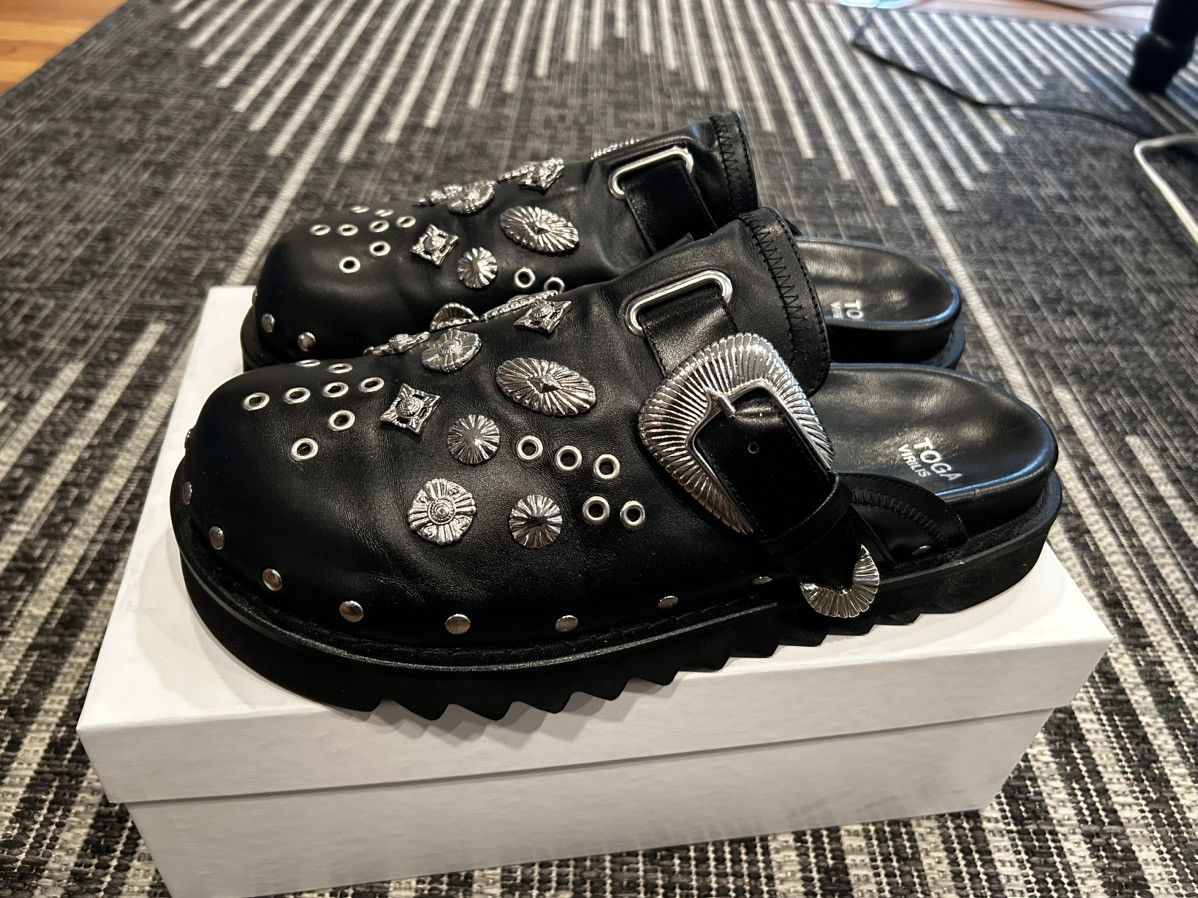 Toga Toga Virilis black leather studded clogs 44 | Grailed