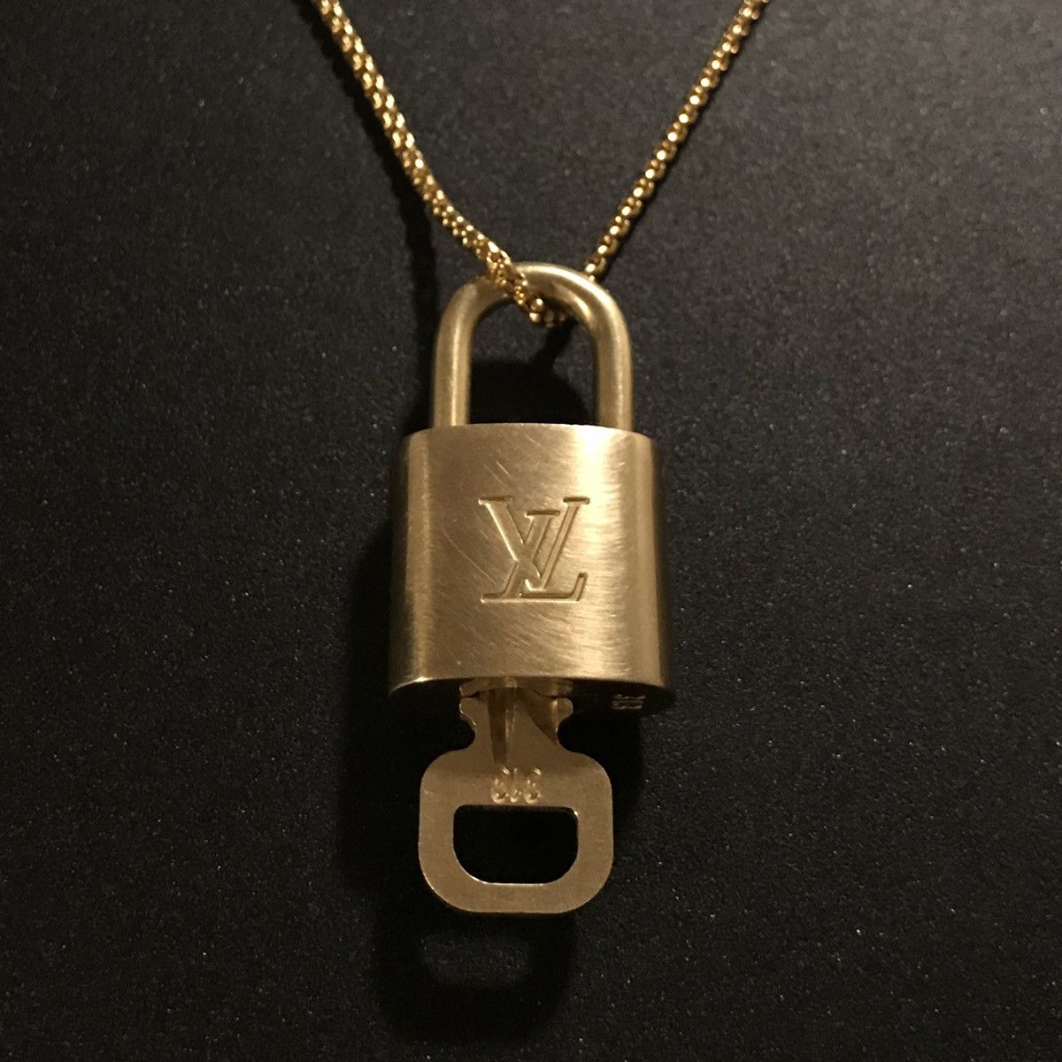 Louis Vuitton Louis Vuitton Lock, Key, & Gold Necklace | Grailed
