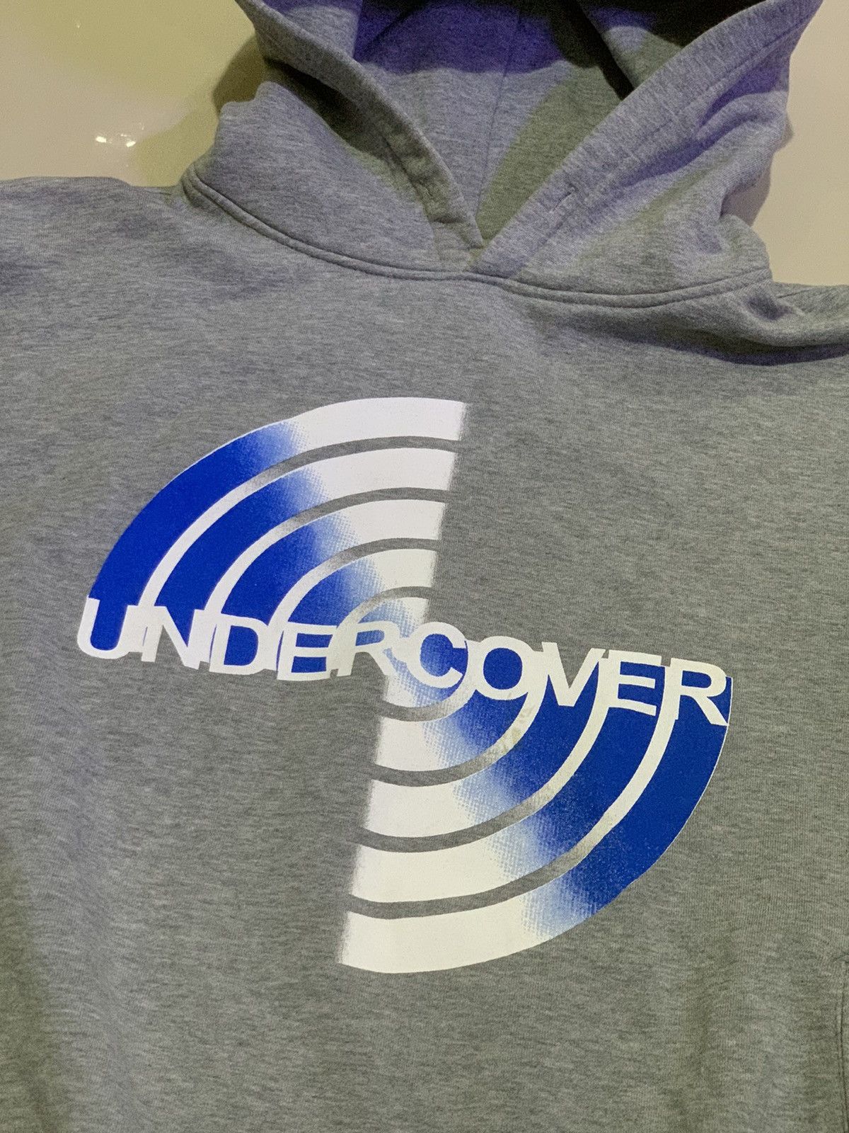 Undercover 🧀Undercover Swirl Logo Hoodie | Grailed