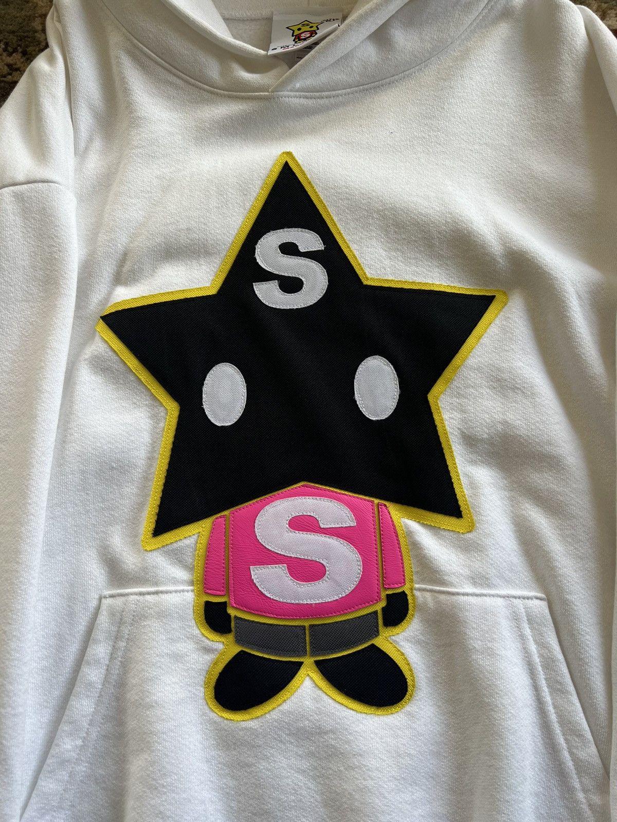 Sukamii Sukami Random Badge Hoodie | Grailed