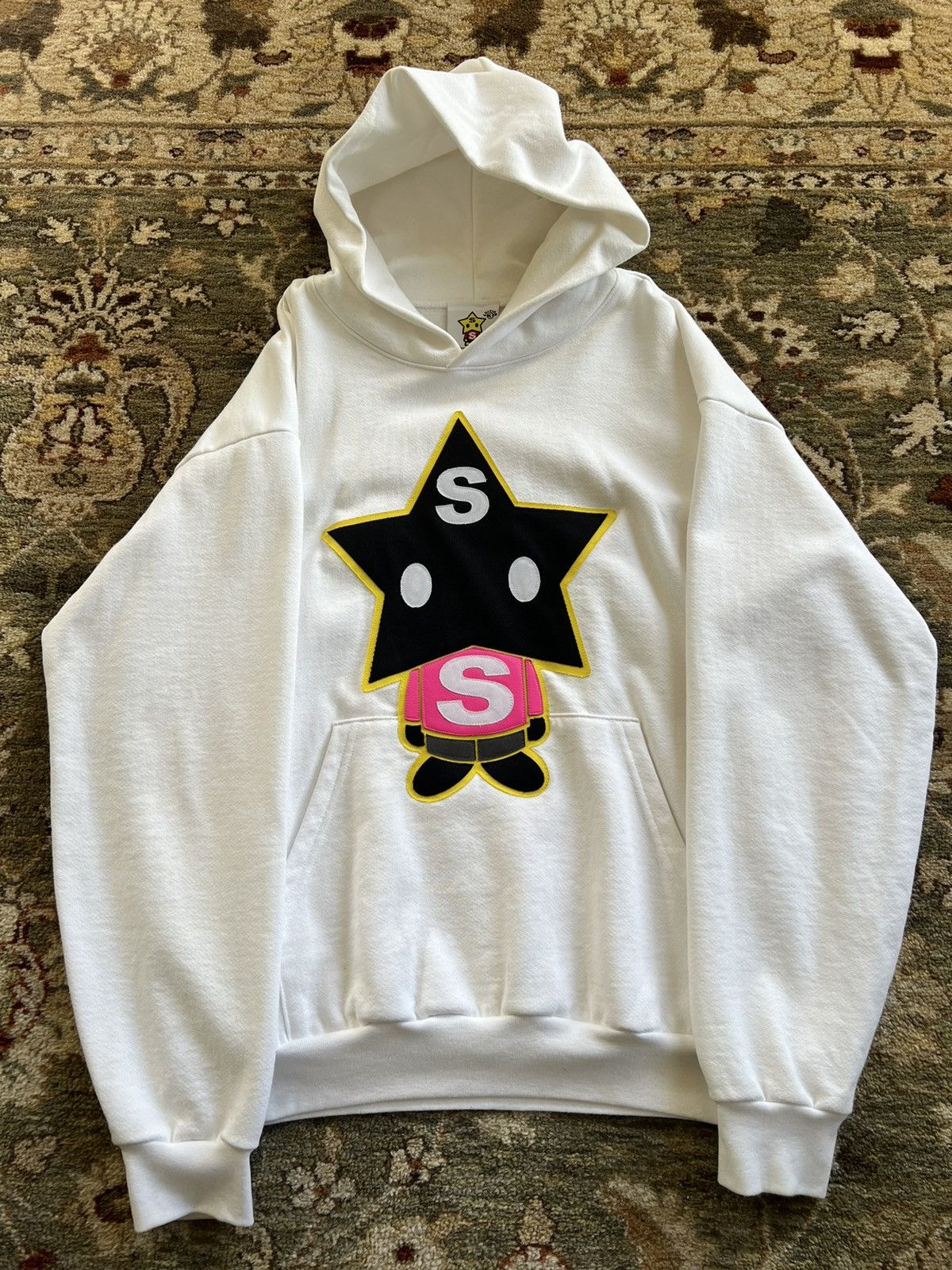 Sukamii Sukami Random Badge Hoodie | Grailed