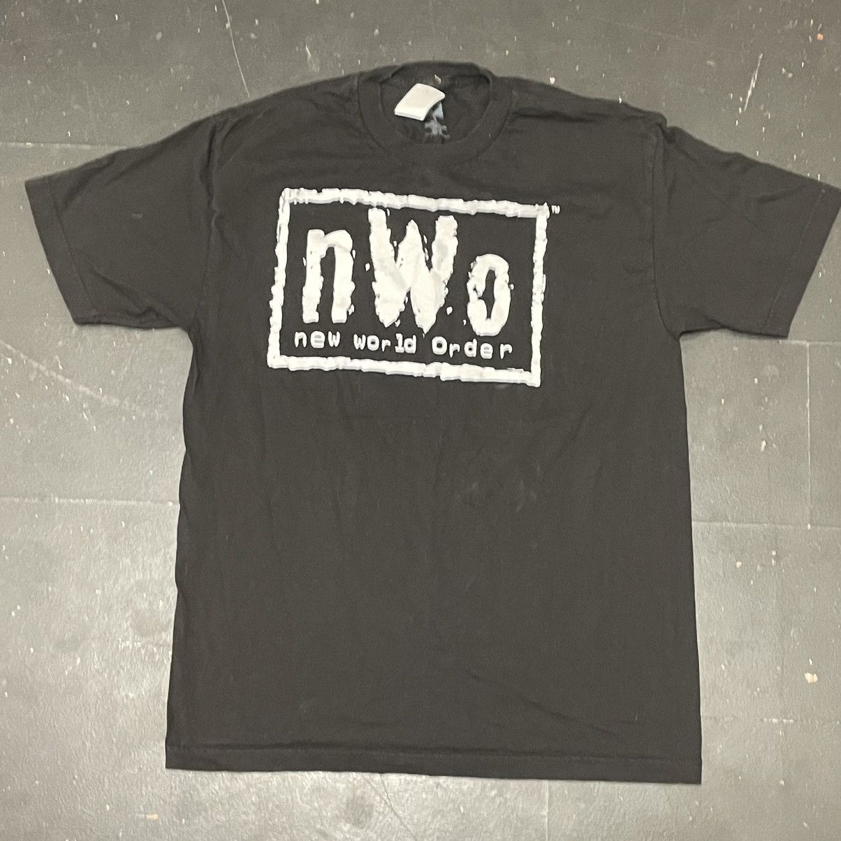 Vintage NWO New World Order Wrestling black graphic logo tee | Grailed