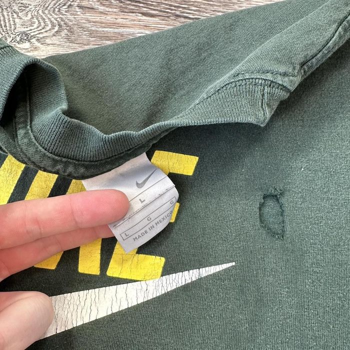 Nike vintage green nike swoosh check sports brand logo t-shirt | Grailed