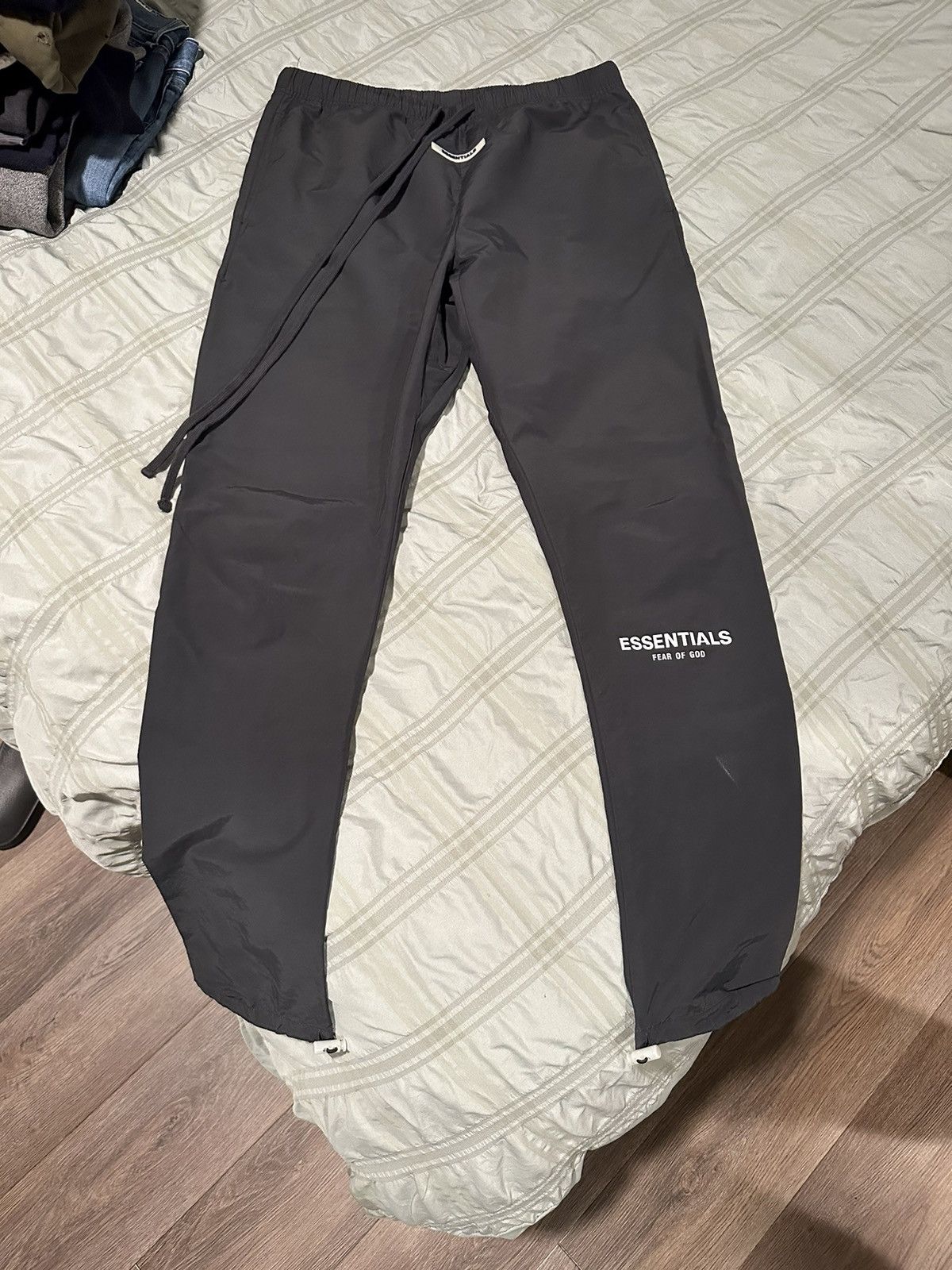Fear of God FOG Essentials black nylon track pants | Grailed