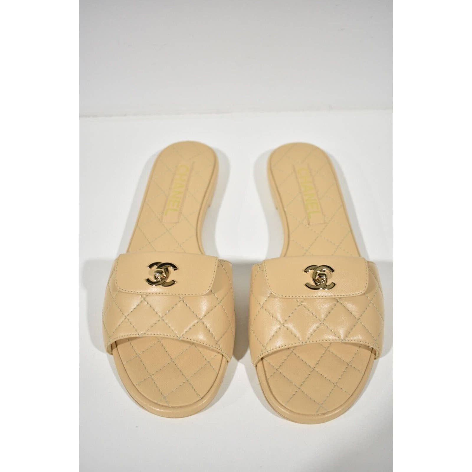 Chanel Chanel REV Beige Turnlock Quilted Gold CC Logo Mule Slides | Grailed