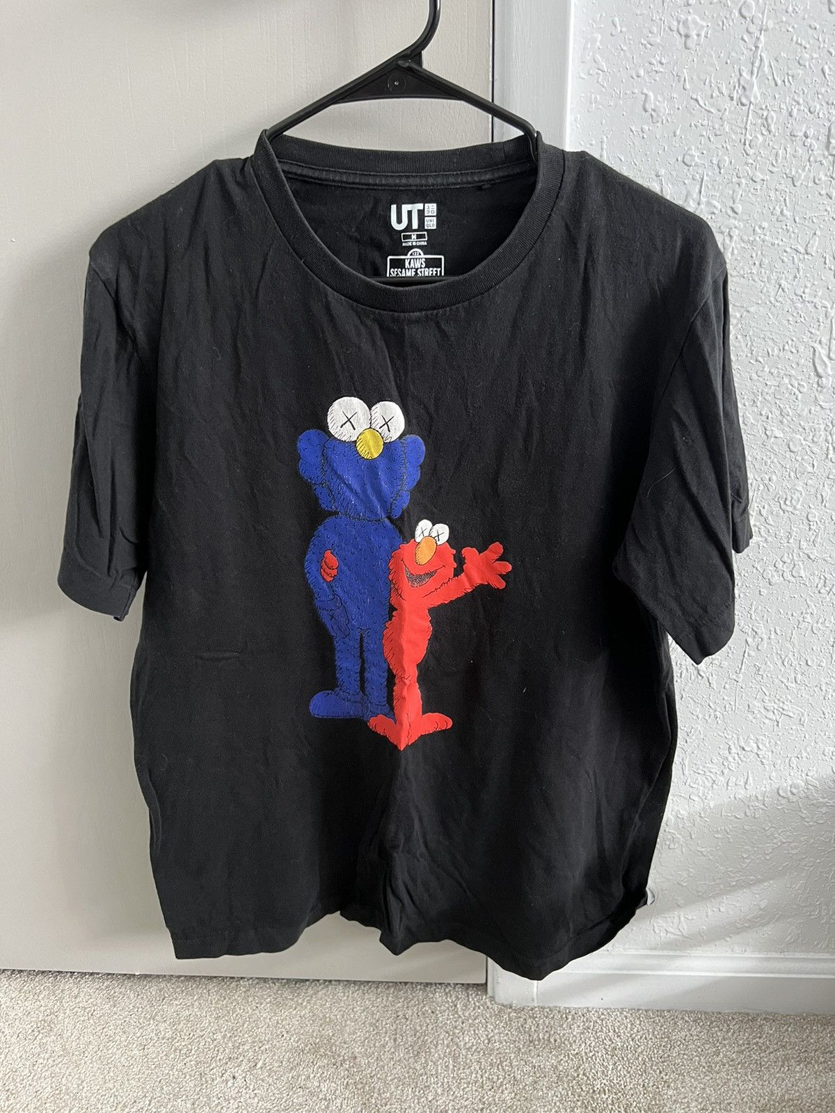 Uniqlo “BFF Elmo” KAWS x Uniqlo x Sesame Street Tee (Black) | Grailed