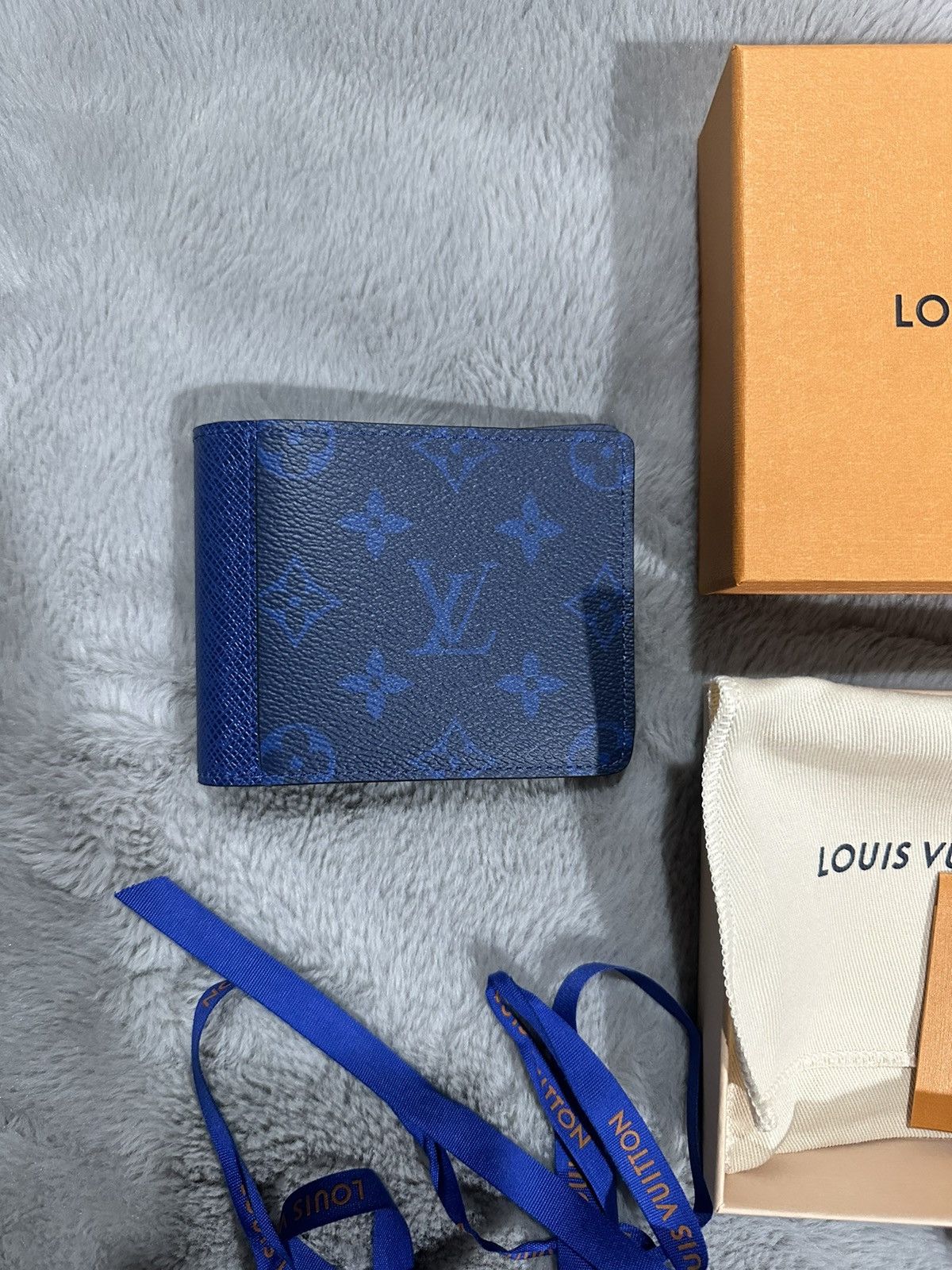 Louis Vuitton Brand New Louis Vuitton Cobalt Blue Multiple Wallet | Grailed