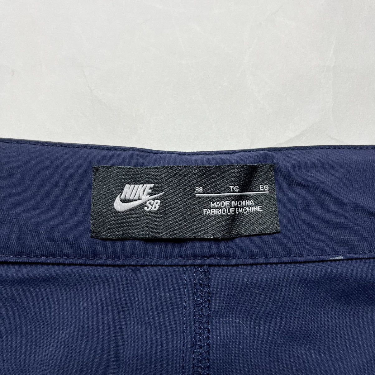 Nike Men’s Nike SB Navy Blue Camp Triangle Pattern Belted Shorts | Grailed
