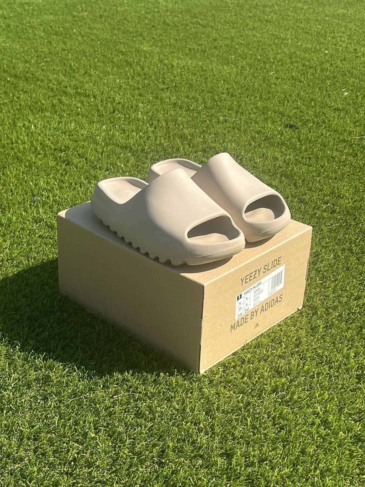 Adidas × Kanye West Yeezy Slide Pure (First Release) | Grailed
