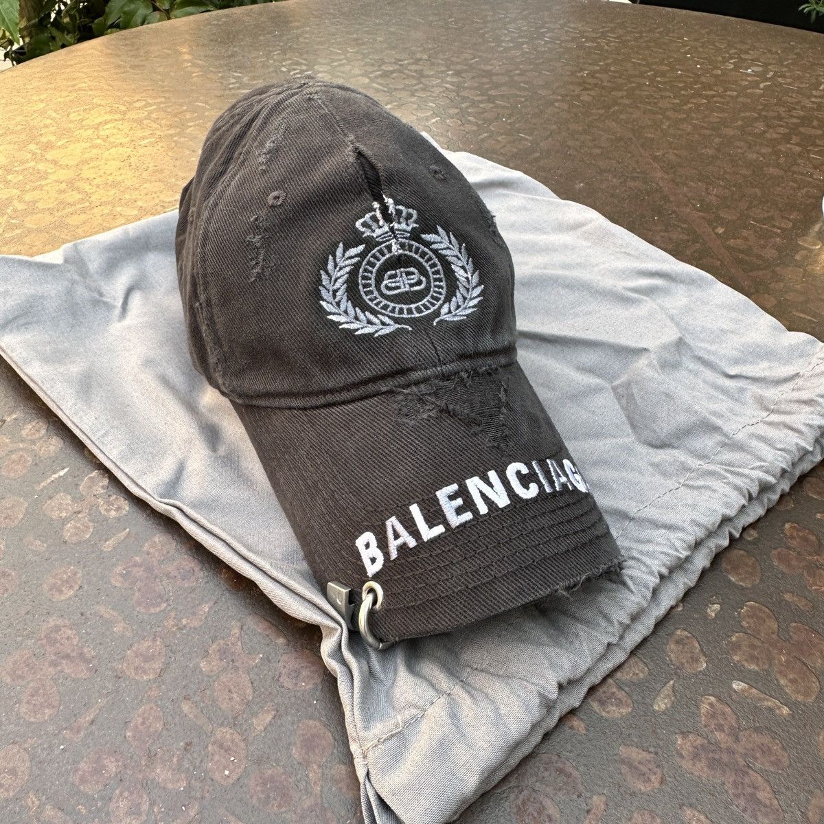 Balenciaga BALENCIAGA DISTRESSED PIERCING CAP | Grailed