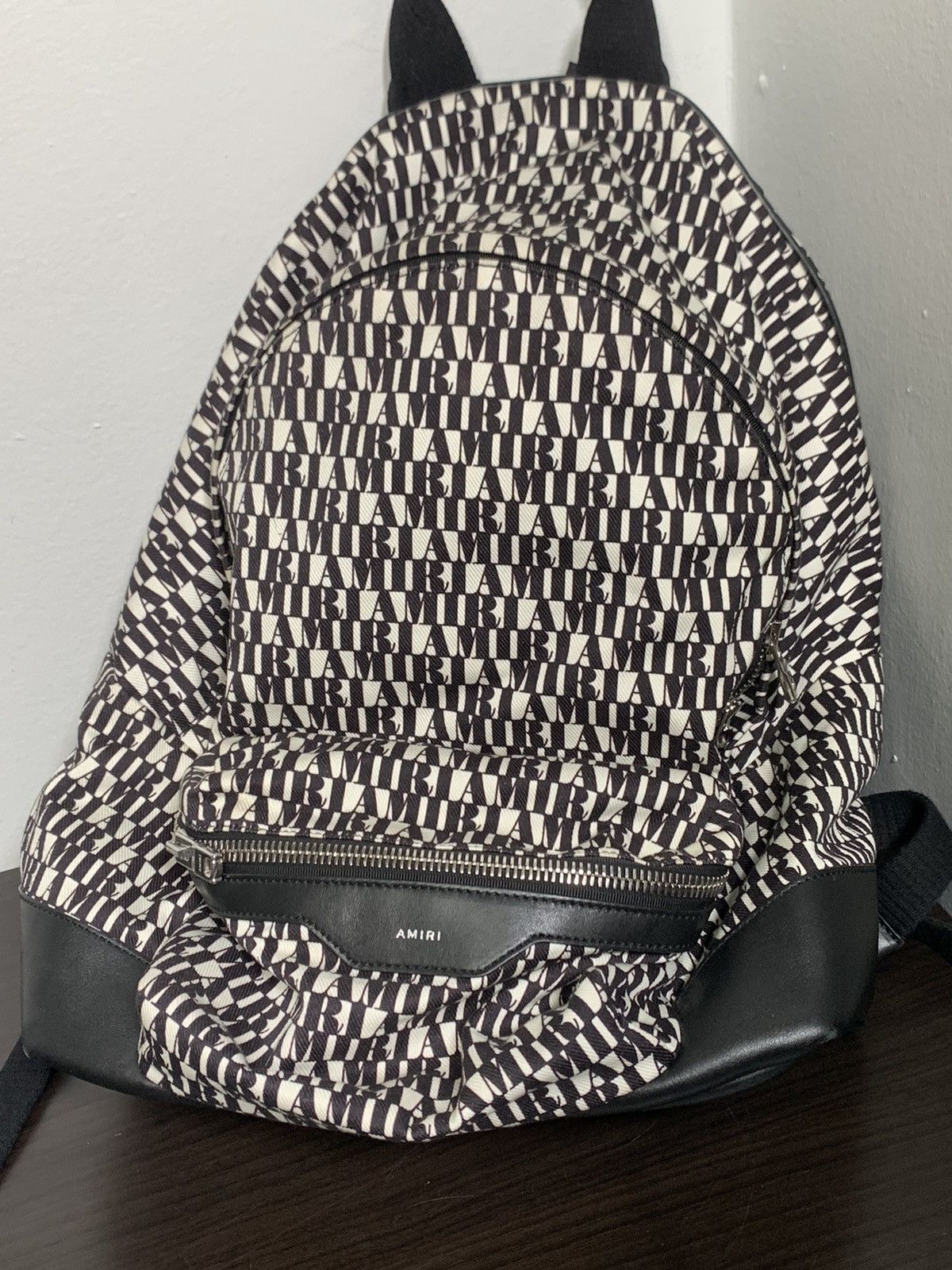 Amiri Amiri Monogram Leather-trim backpack | Grailed