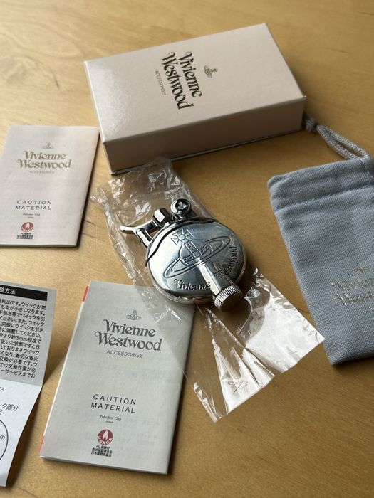 Vivienne Westwood Brand New in Box Engraved Orb Lighter Never been ... Vivienne Westwood Brand New in Box Engraved Orb Lighter Never been ...