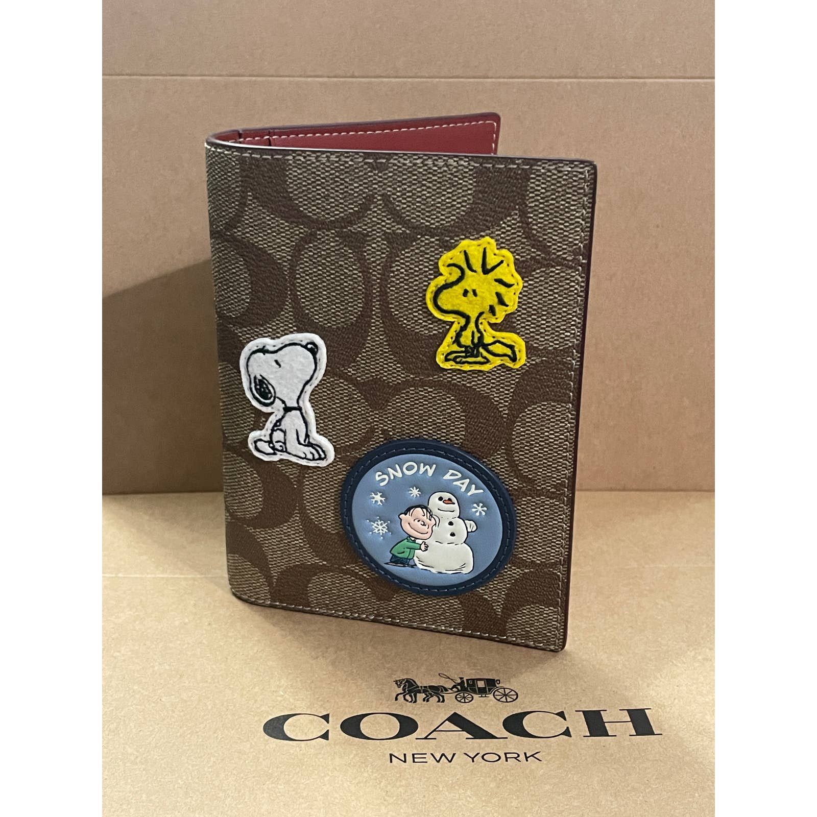 Coach Coach Peanuts Passport Case In Signature Canvas With Patches ...